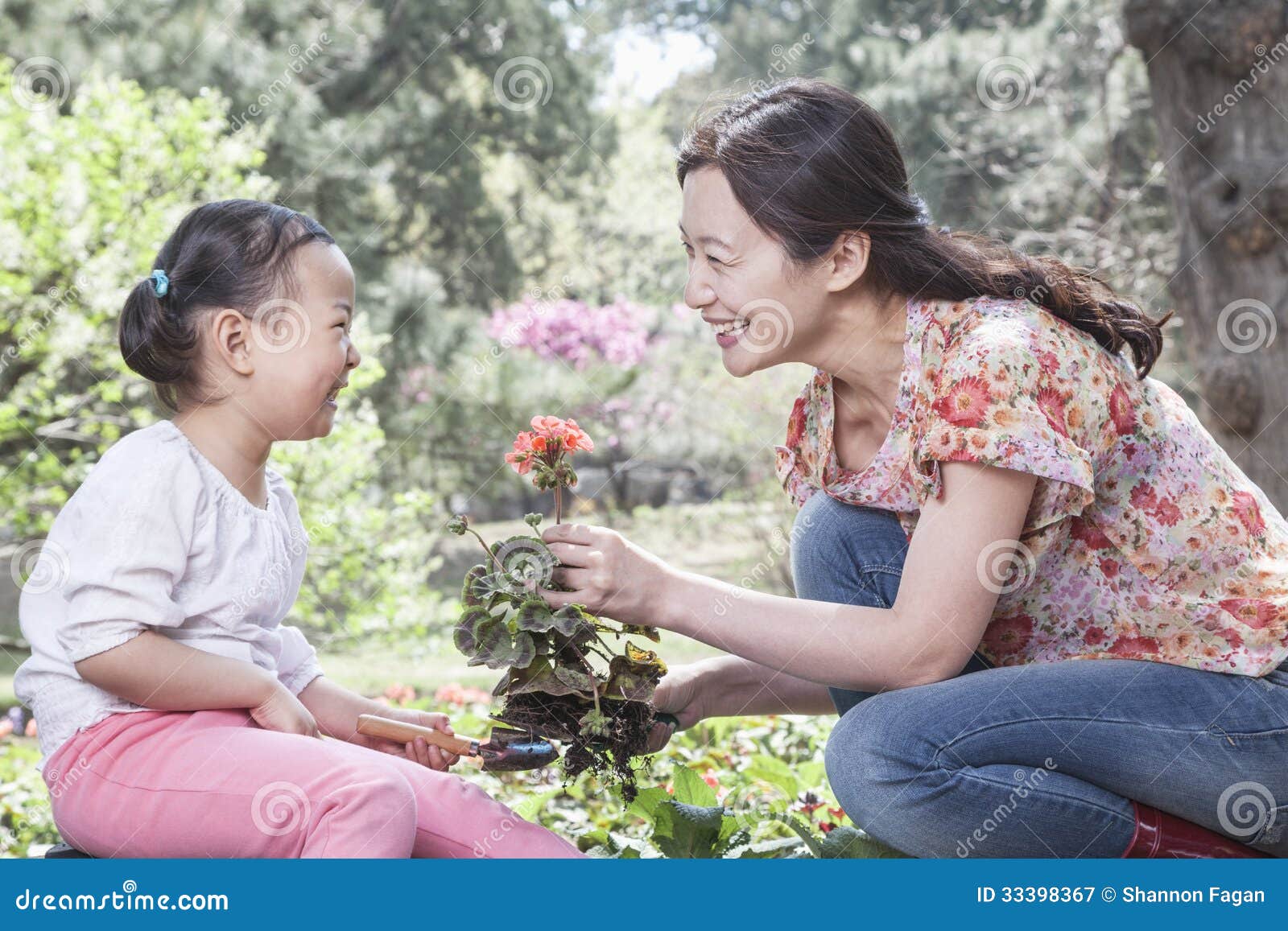 Mother and Daughter Planting Flowers. Stock Image - Image of fragrant ...