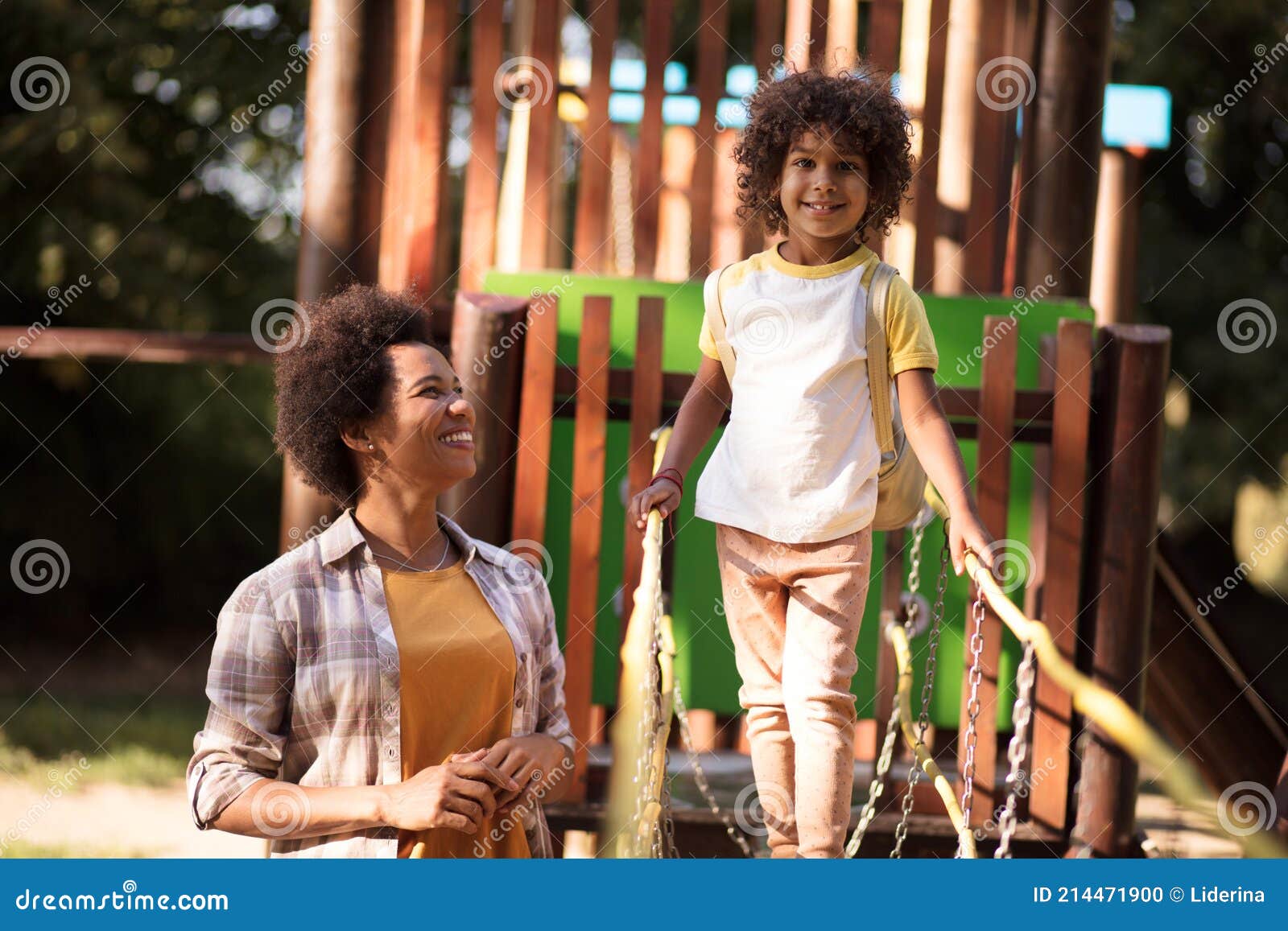 Mother and Daughter on Playground Stock Photo - Image of cheerful ...