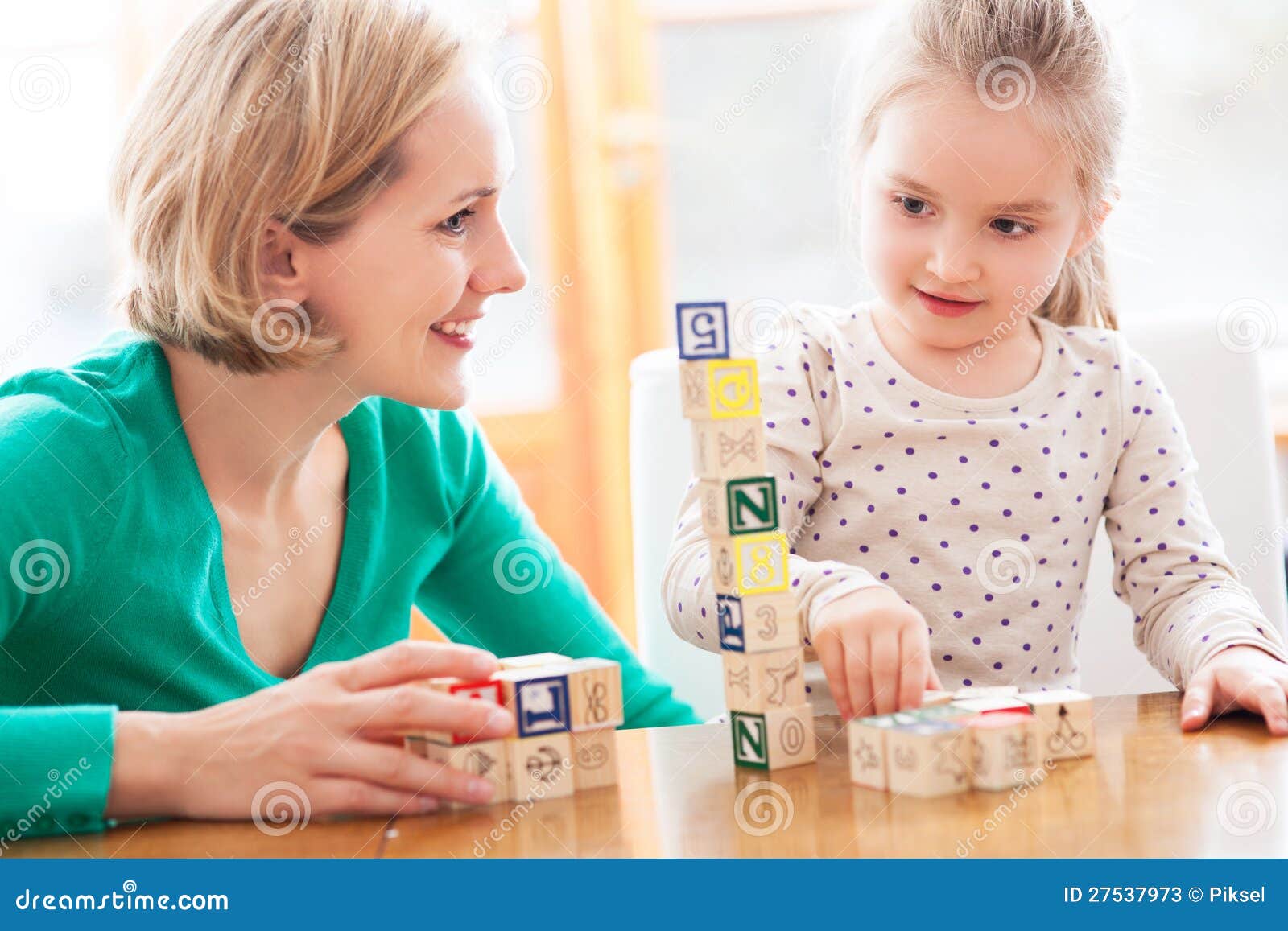 Mother and Daughter Playing with Blocks Stock Image - Image of ...