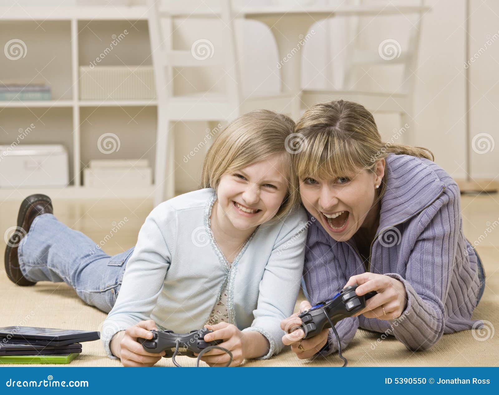 Mother and Daughter Playing Video Game Stock Photo - Image of gaming ... Mother and Daughter Playing Video Game Stock Photo - Image of gaming ...