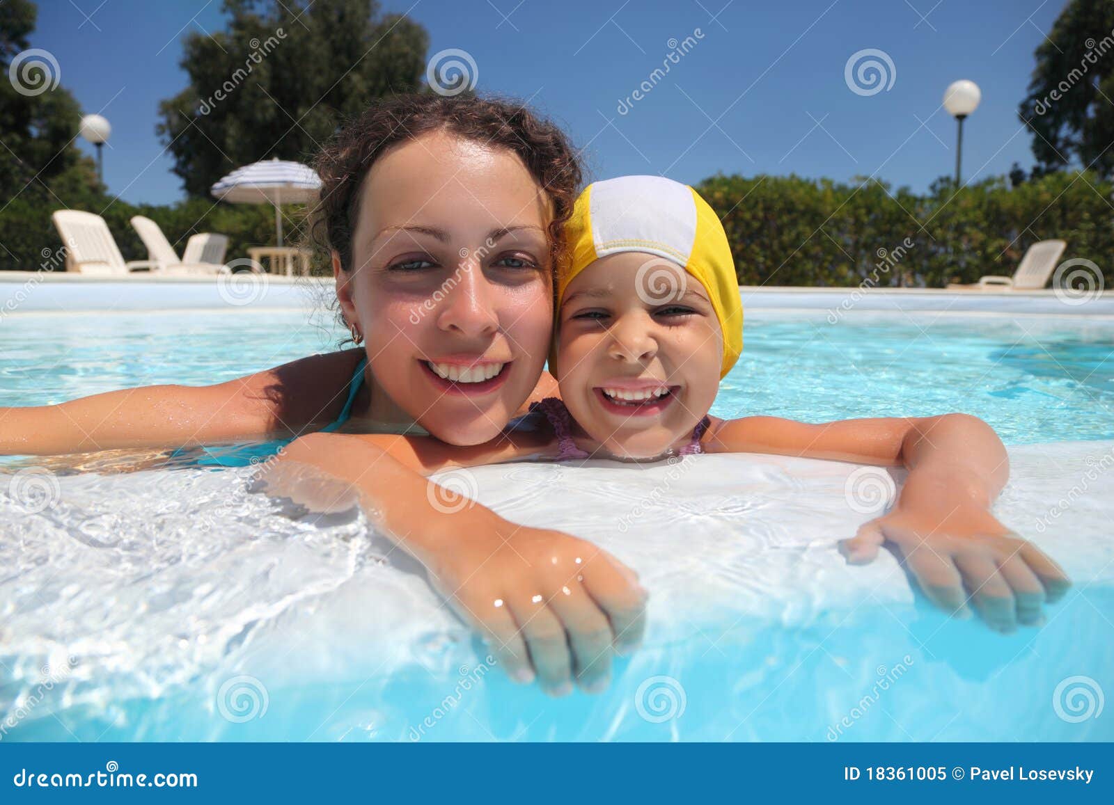 Mother with Daughter in Pool Stock Image - Image of children, smile ...