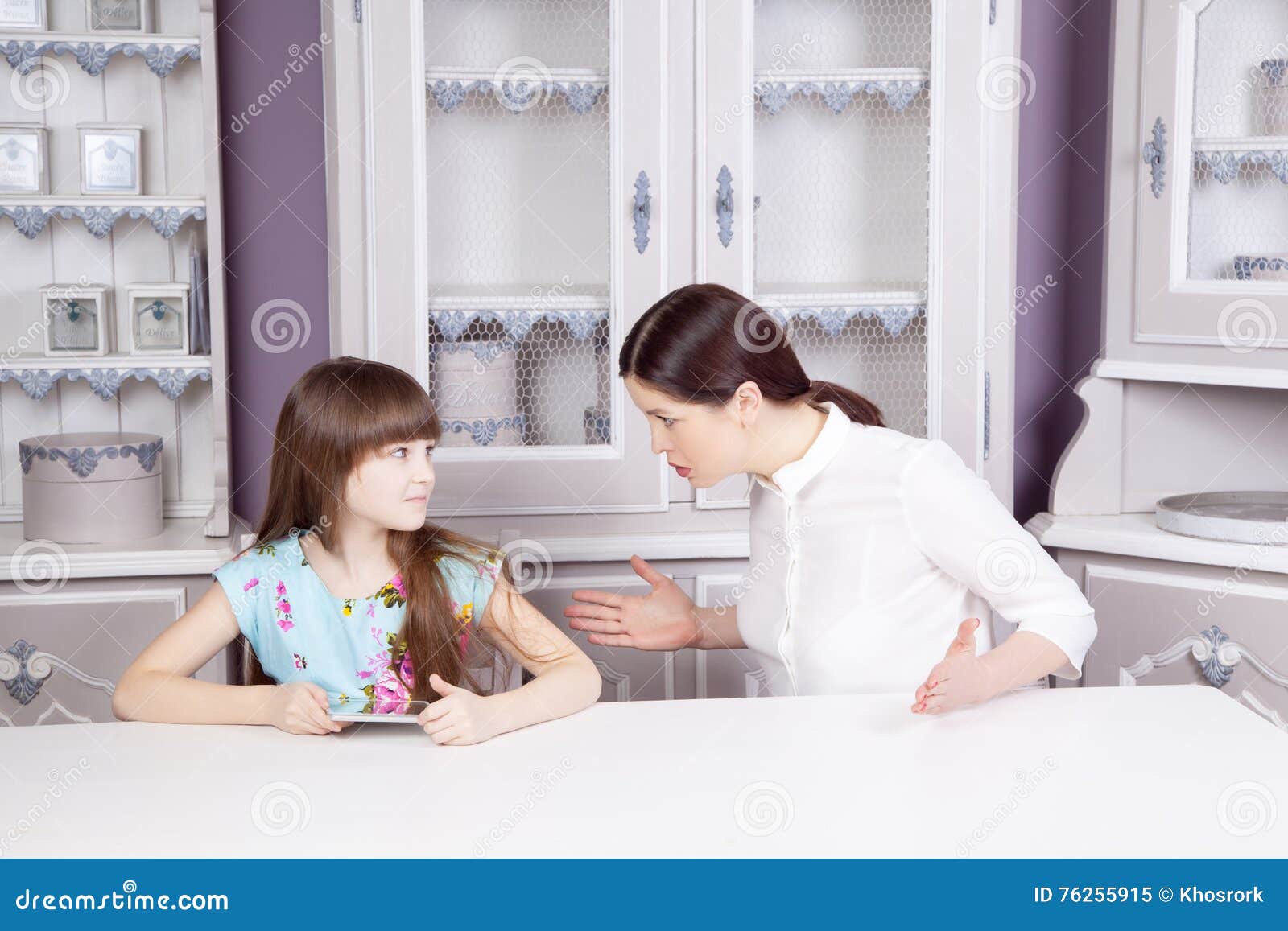 Mother and Daughter Quarrel because of Overuse Technology Stock Image ...