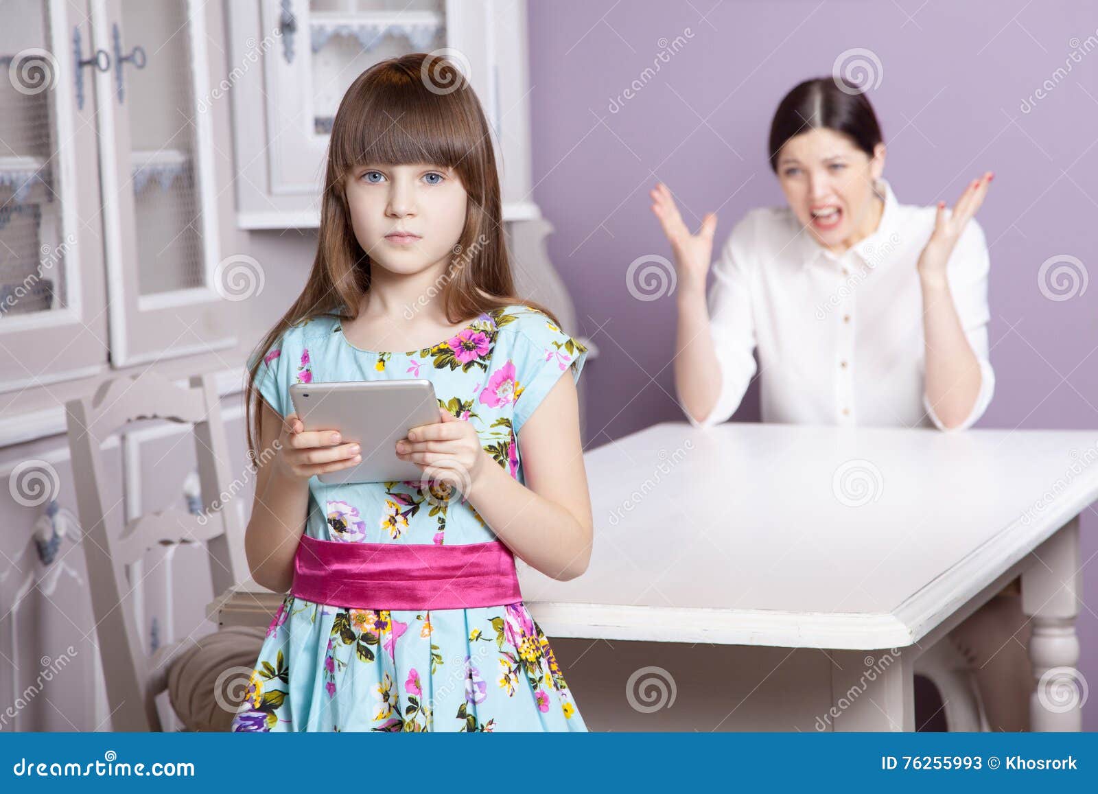 Mother and Daughter Quarrel because of Overuse Technology Stock Image ...