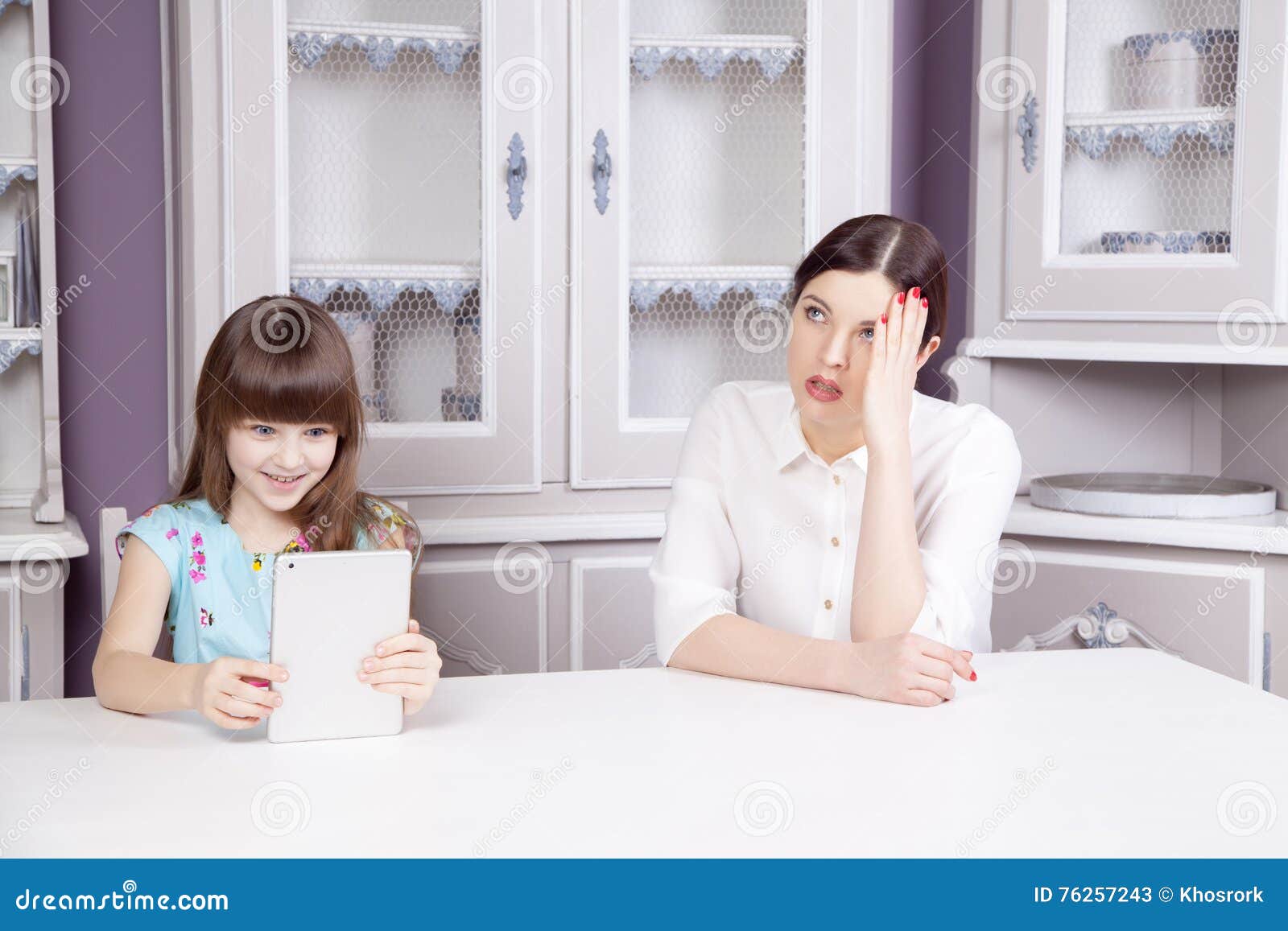 Mother and Daughter Quarrel because of Overuse Technology Stock Image ...