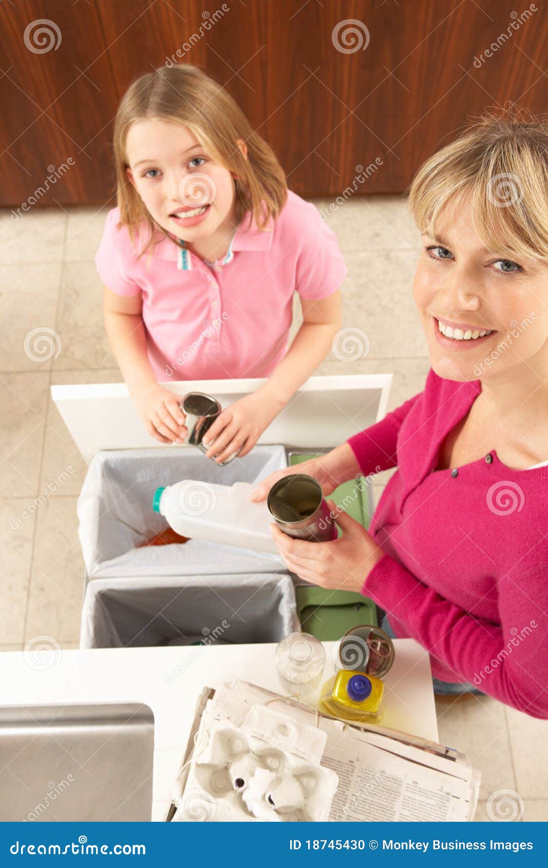 Mother and Daughter Recyling Waste at Home Stock Photo - Image of ...