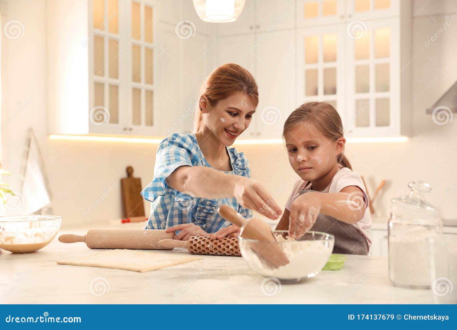 Mother and Daughter Rolling Dough in Kitchen Stock Image - Image of ...