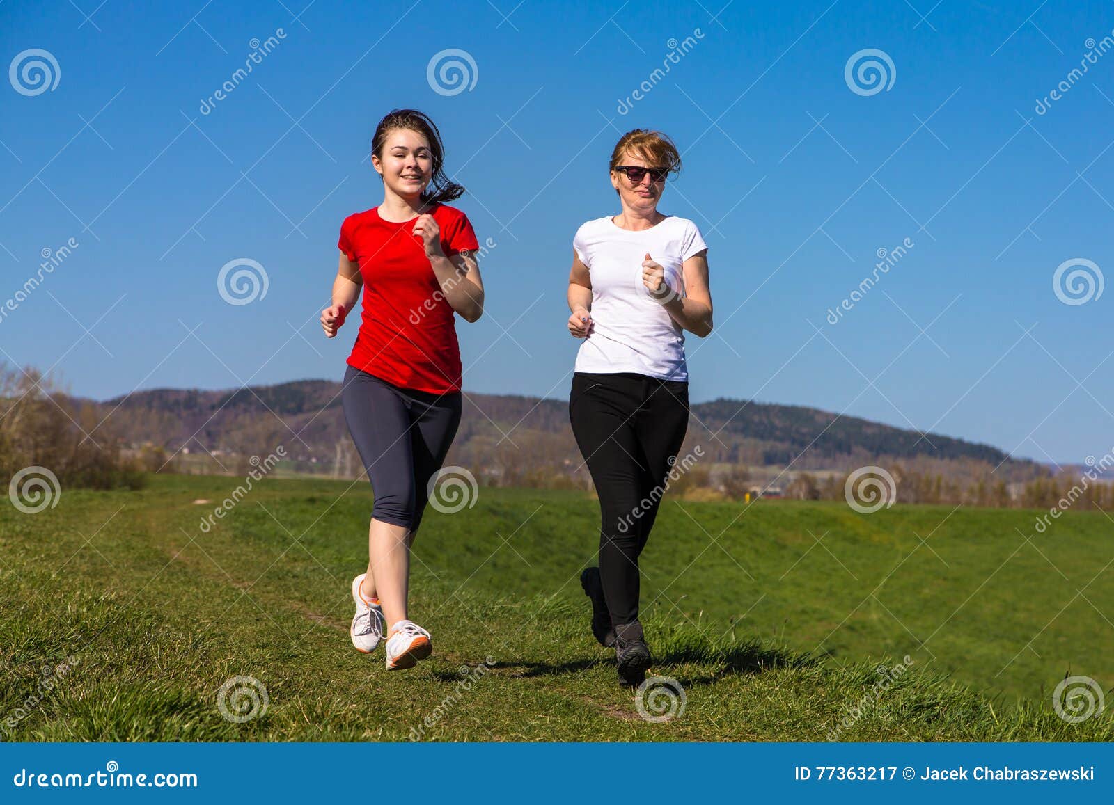 Mother and Daughter Running Stock Image - Image of female, body: 77363217