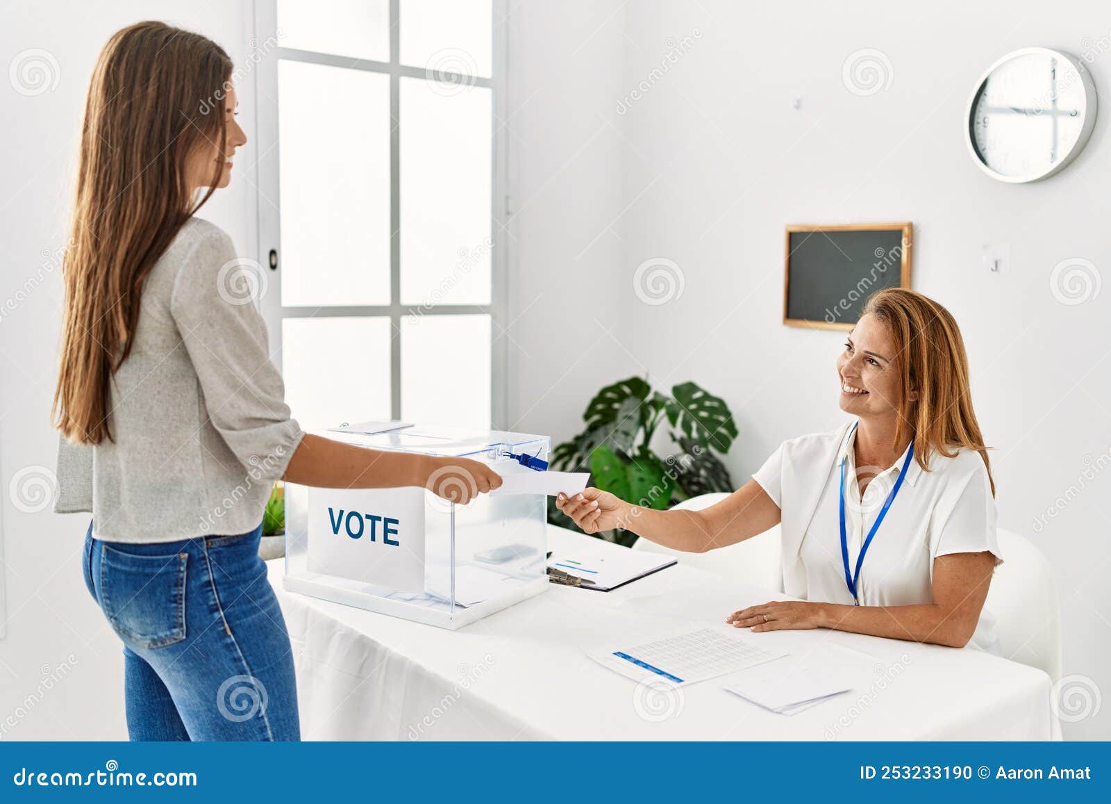Mother and Daughter Smiling Confident Voting at Electoral College Stock ...