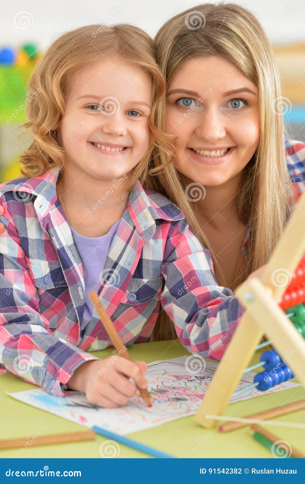 Mother and Daughter Study at the Table Stock Photo - Image of daughter ...