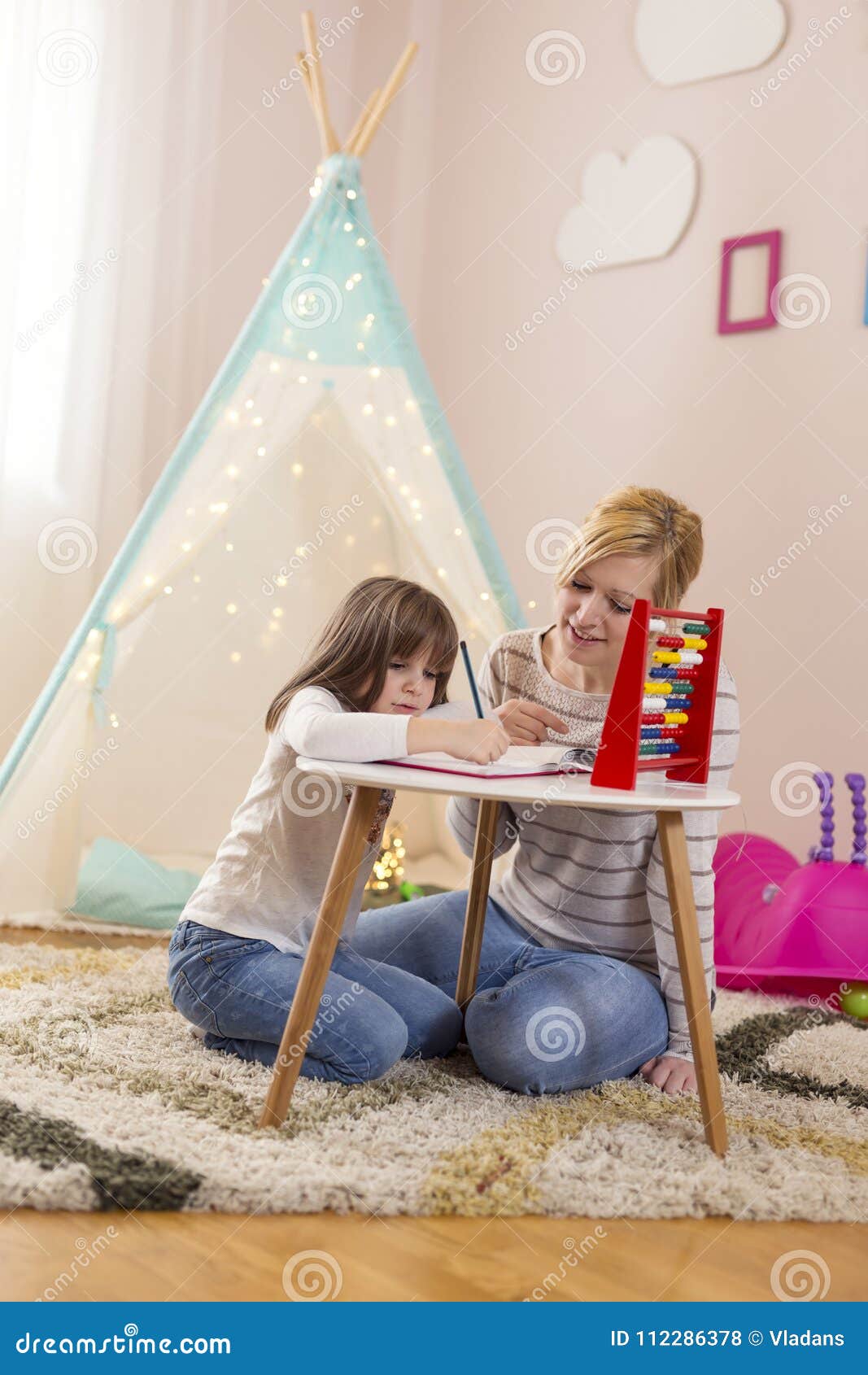 Solving math problems stock photo. Image of home, nursery - 112286378