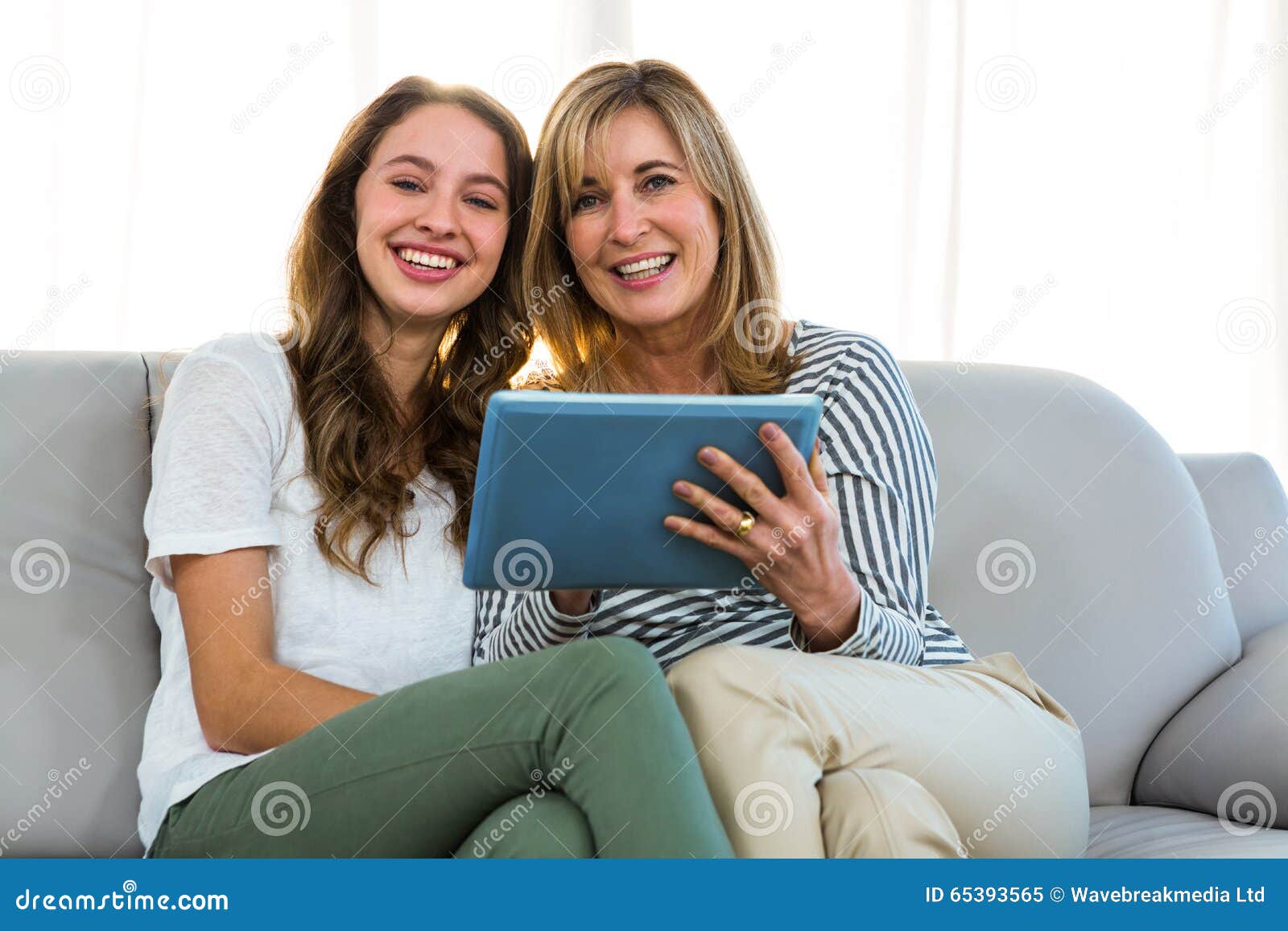 Mother and Daughter Use Tablet Stock Image - Image of brown, adult ...