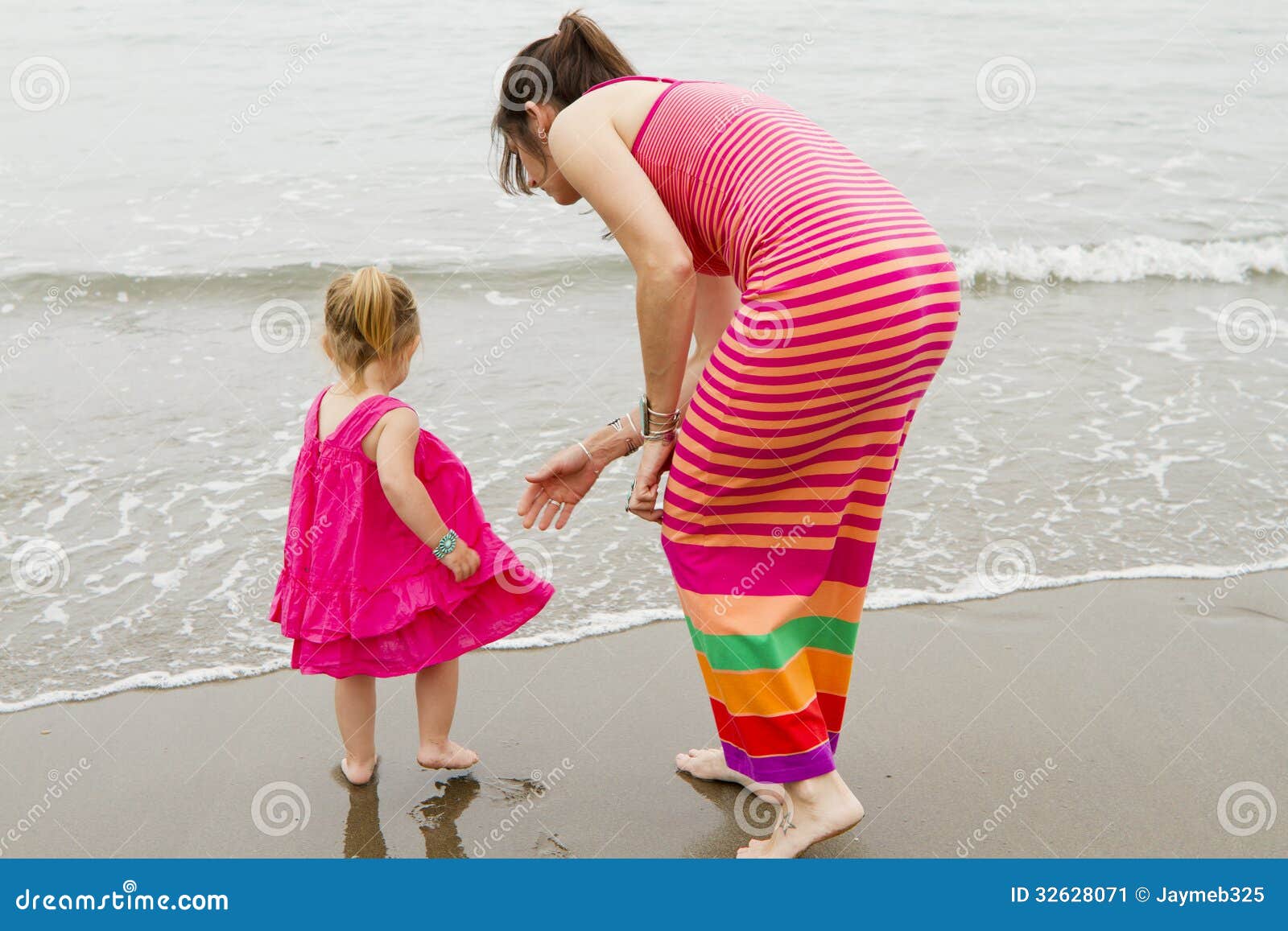 Mother and Daughter in the Water Stock Image - Image of cloudy, toddler ...