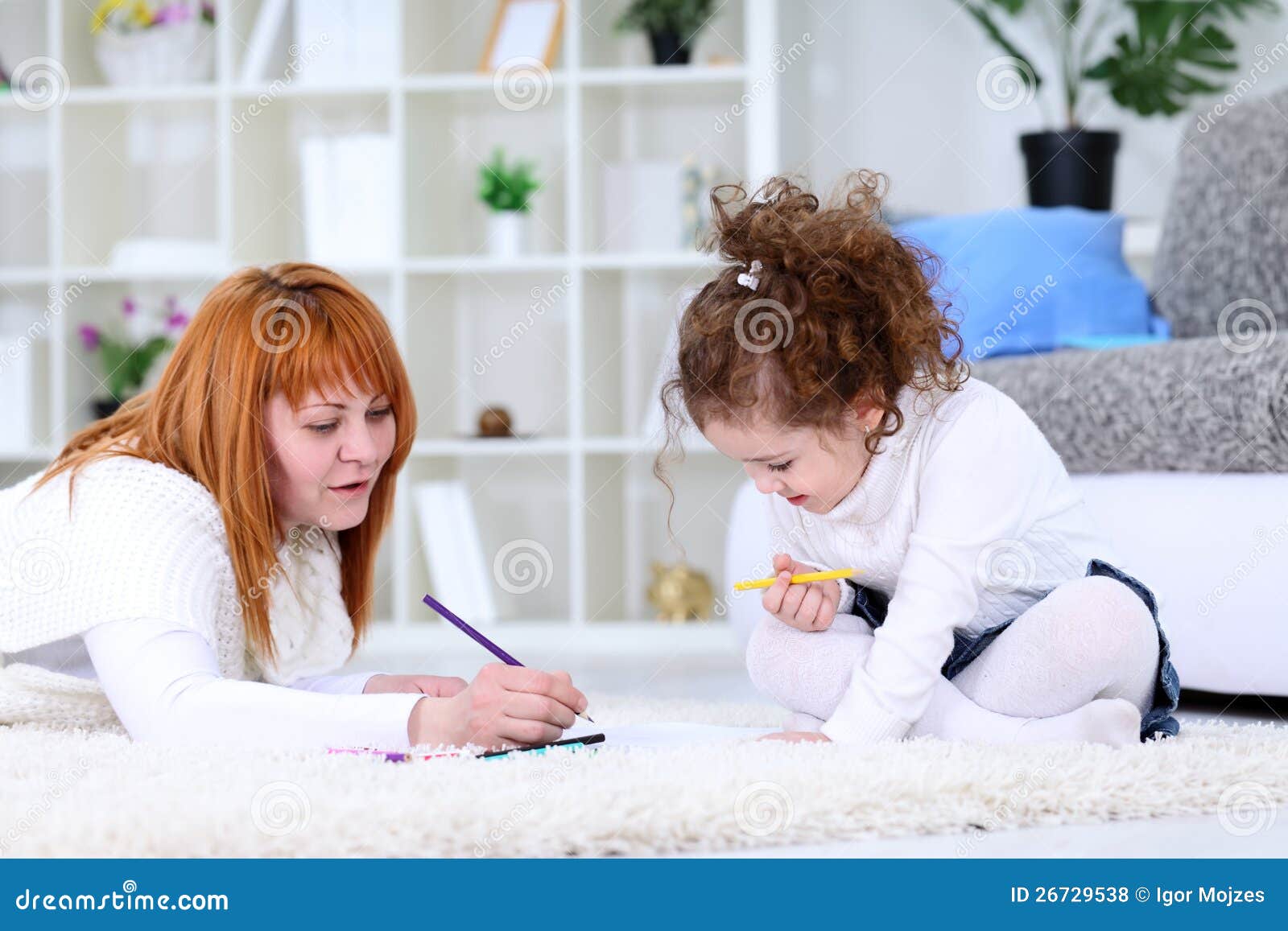 Mother and Daughter Writing Together Stock Photo - Image of background ...