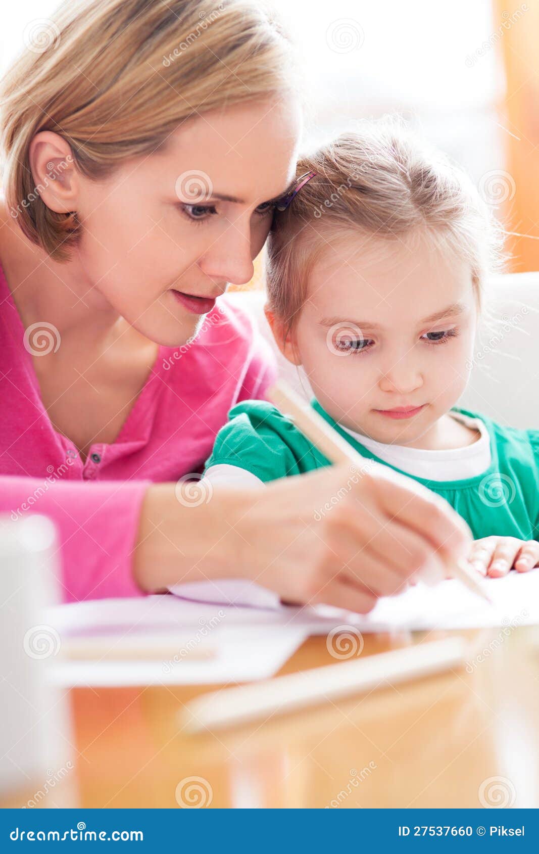 Mother and Daughter Writing Together Stock Photo - Image of domestic ...
