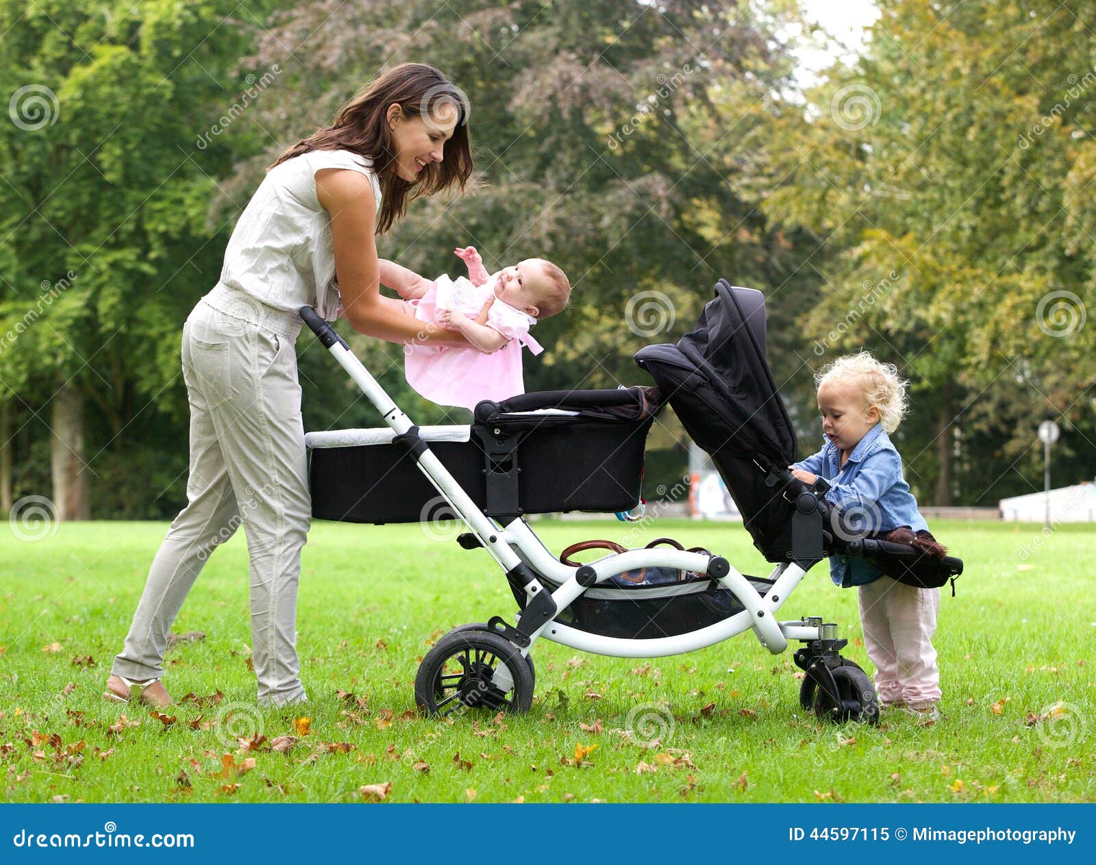 Mother and Daughters with Pram Outdoors Stock Image - Image of mother ...