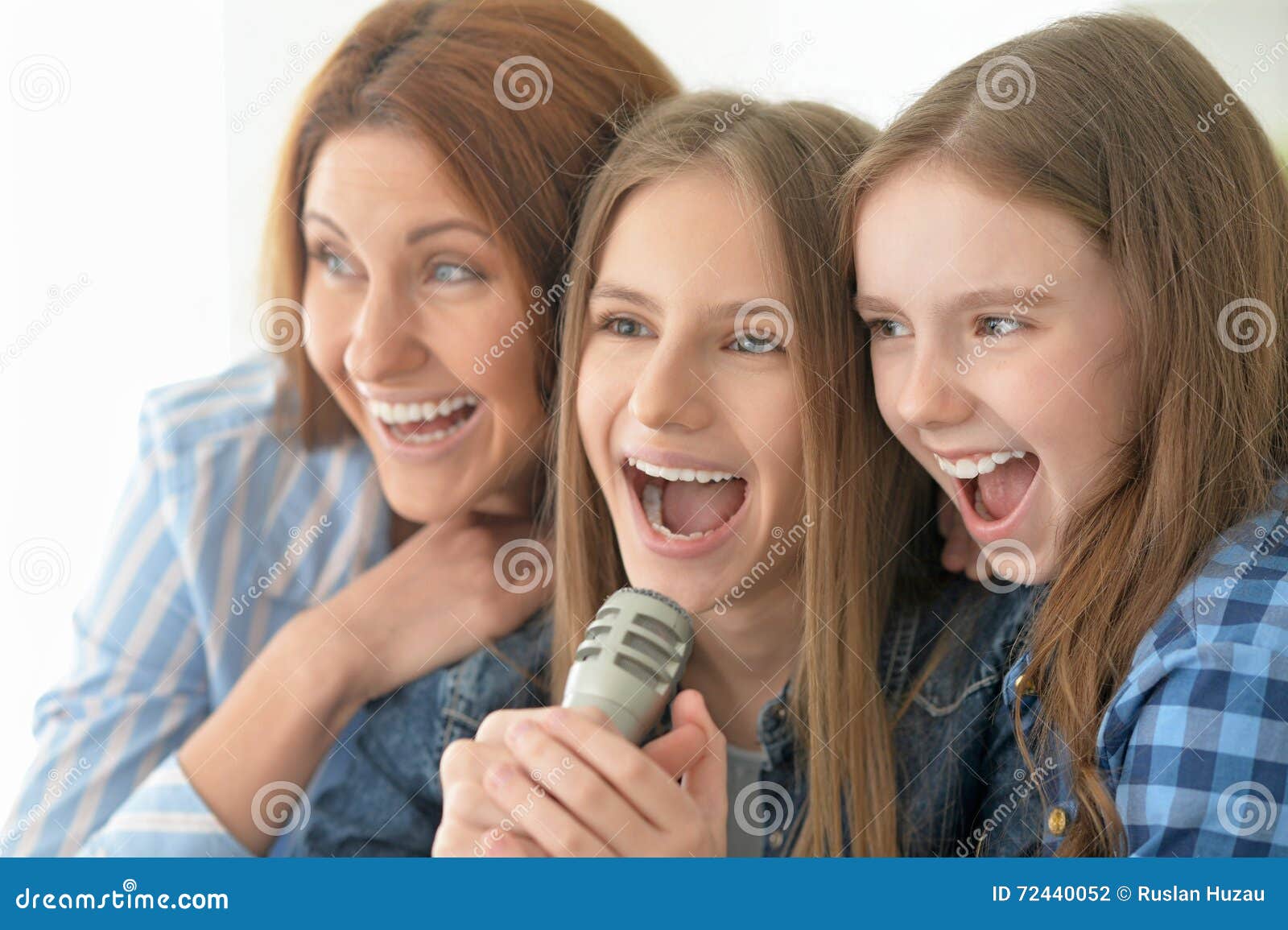 Mother and Daughters Singing Karaoke Stock Photo - Image of cute, jenga ...