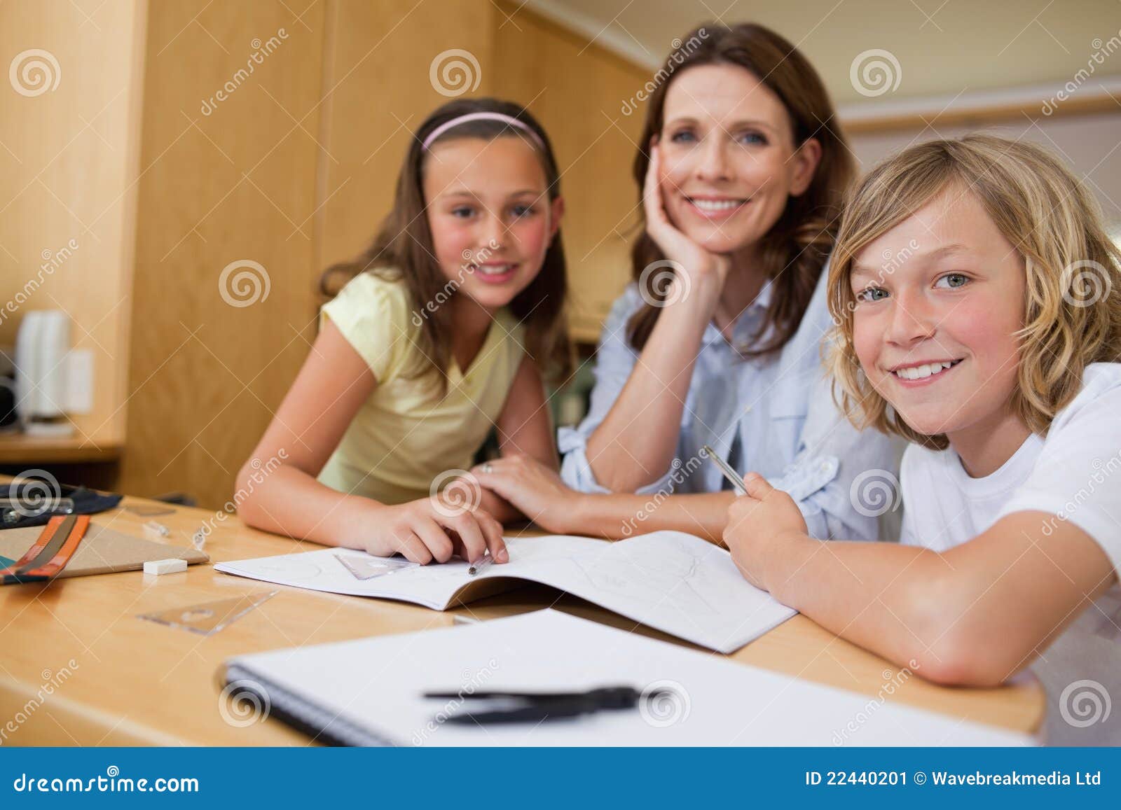 Mother Doing Homework with Children Stock Image - Image of reading ...