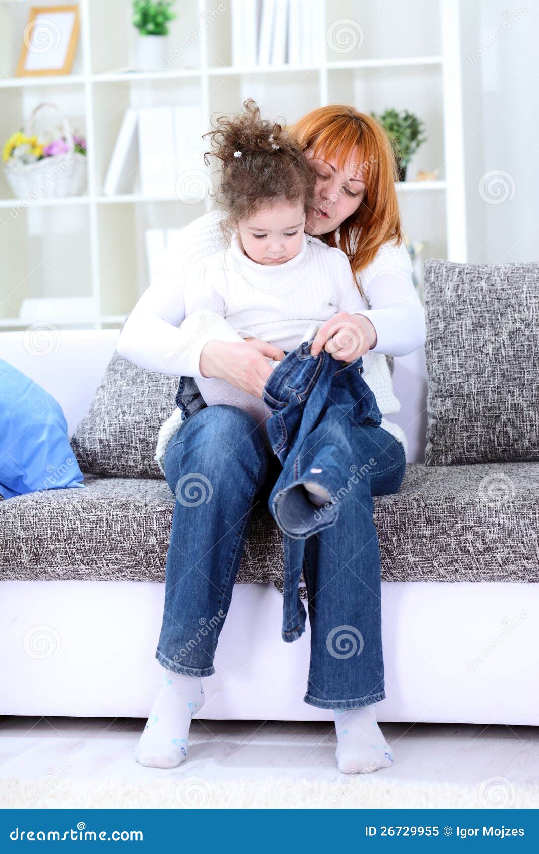 Mother dressed the child stock image. Image of ready - 26729955