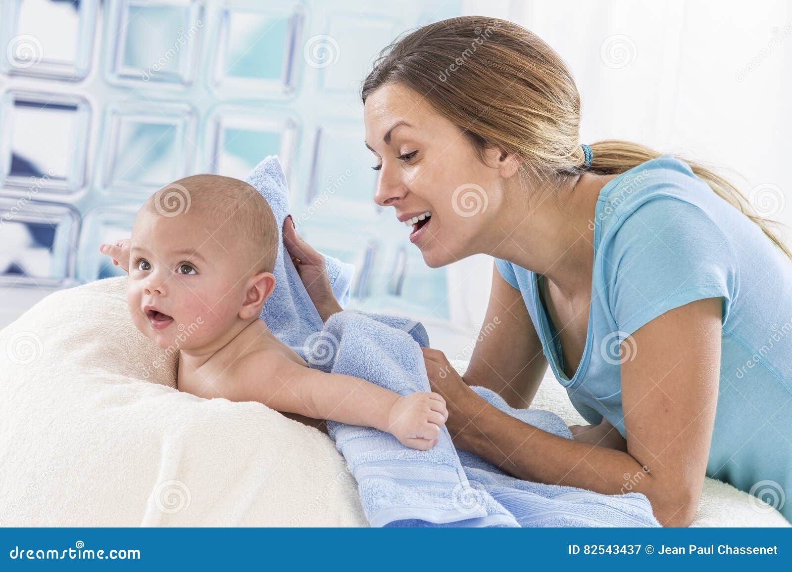 Mother is Drying Her Baby Boy after Bathing with Tenderness Stock Image ...