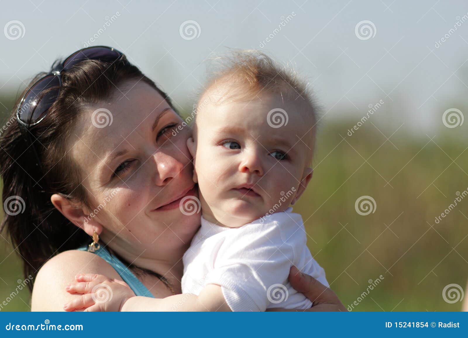 Mother embraces her baby stock photo. Image of beauty - 15241854