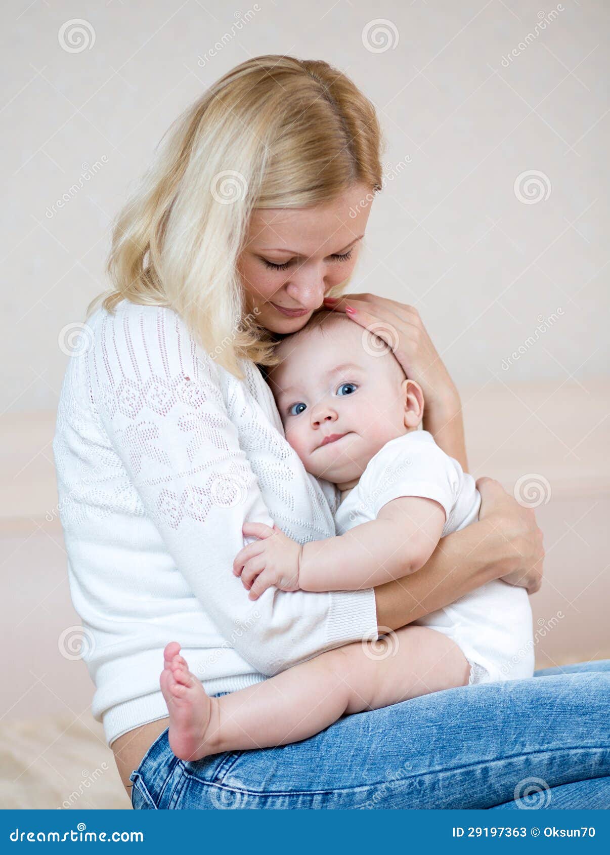 Mother Embracing Baby Indoors Stock Image - Image of family, cheerful ...