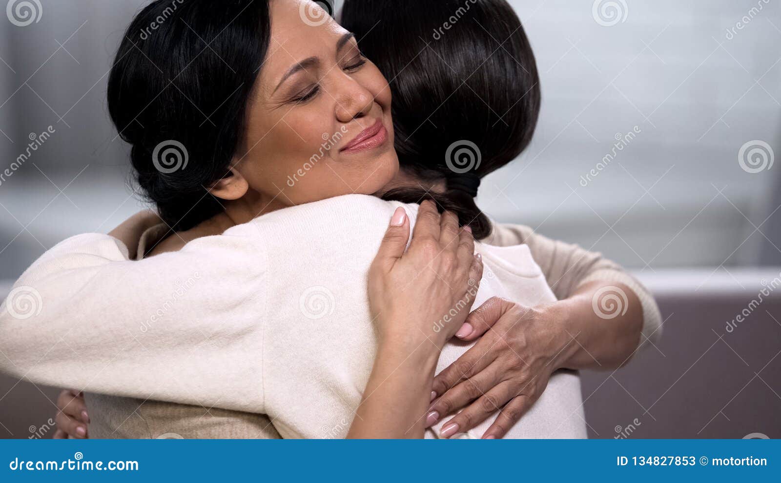 Mother Embracing Young Daughter Empathy And Tenderness Love And