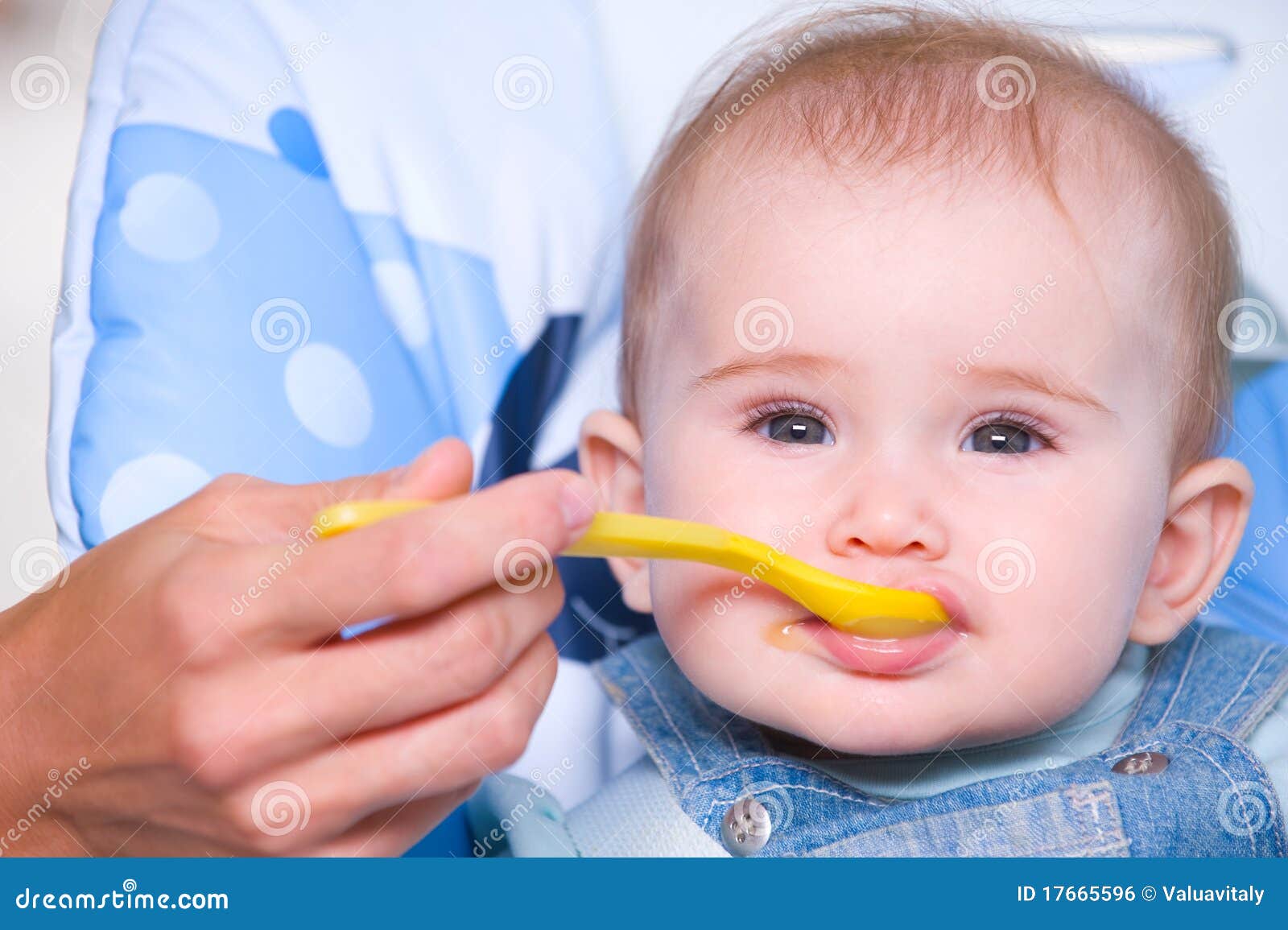 Mother feeding hungry baby stock photo. Image of infant - 17665596