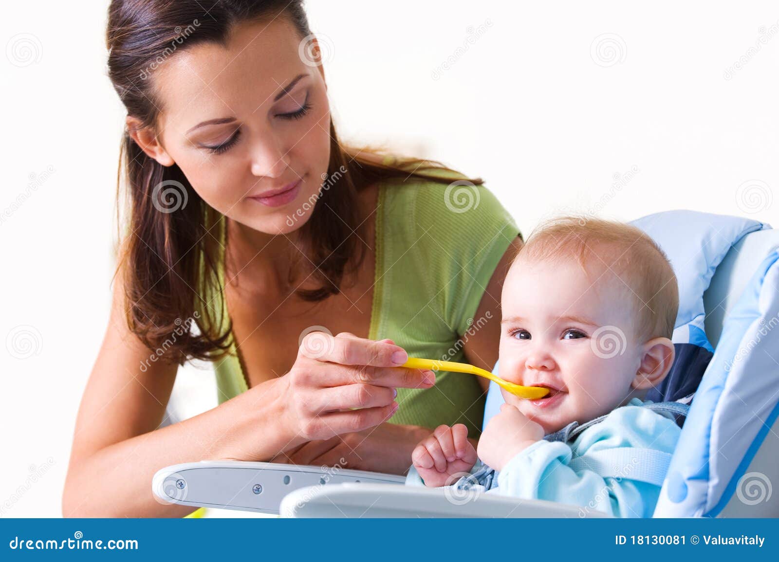 Mother feeding hungry baby stock image. Image of adorable - 18130081