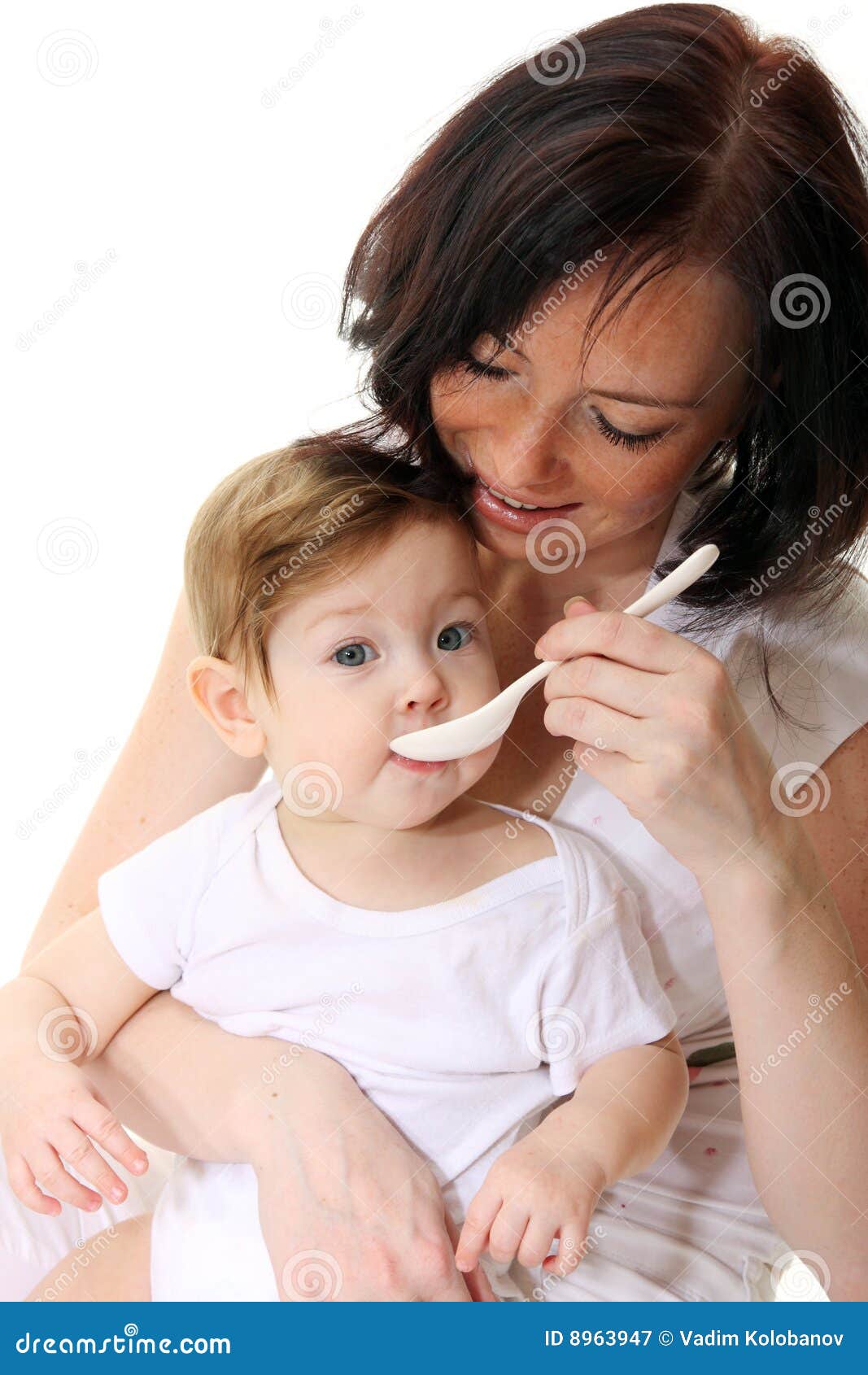 Mother feeding hungry baby stock image. Image of girl - 8963947