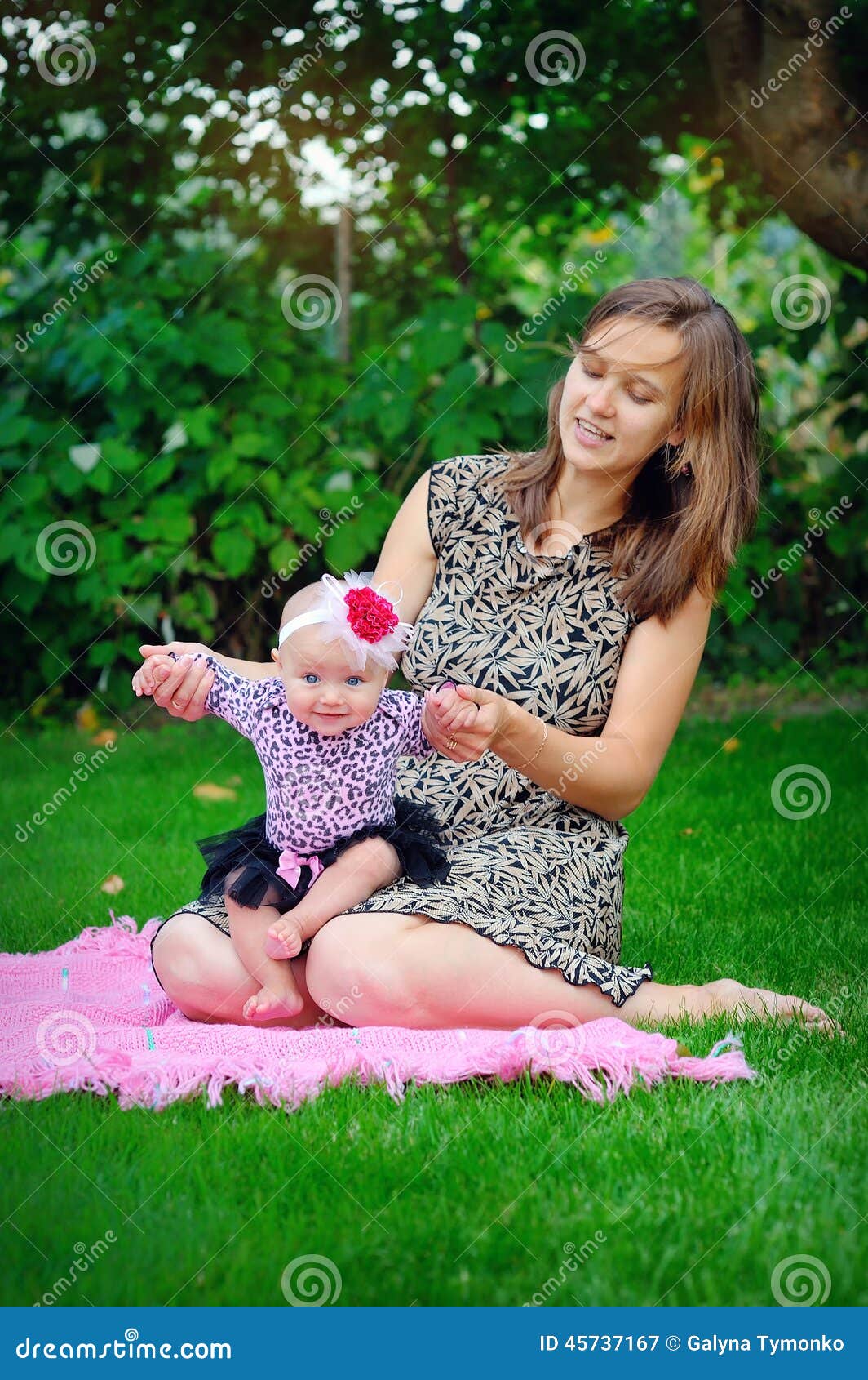 Mother Giving Daughter Ride on Back in Park Stock Image - Image of ...