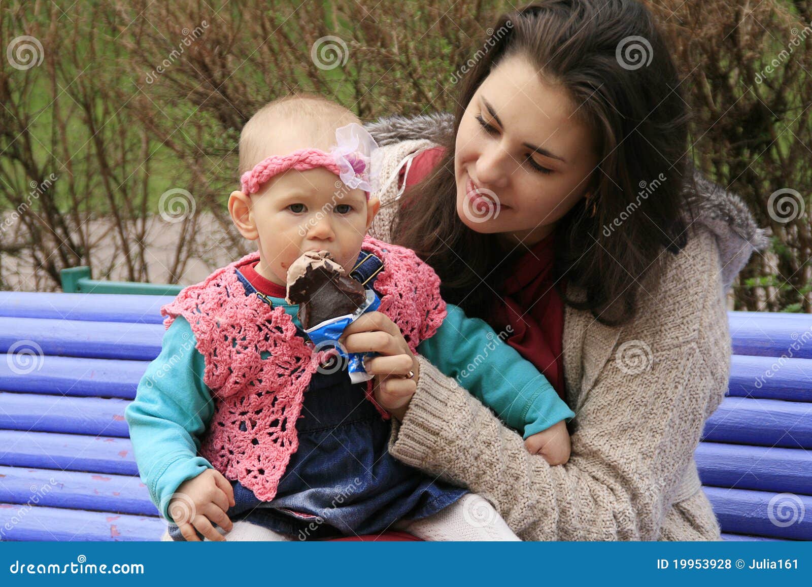 Mother Giving Ice-cream To Child Stock Photo - Image of family, gelatto ...