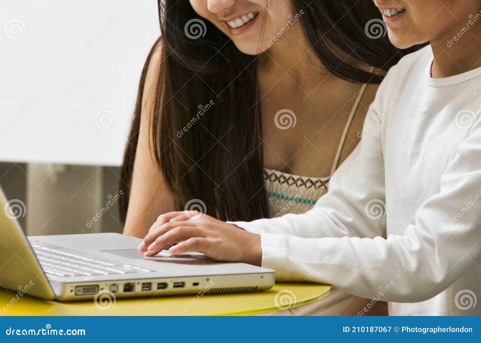 Mother Guiding Her Daughter on Online Class with the Laptop Stock Image ...
