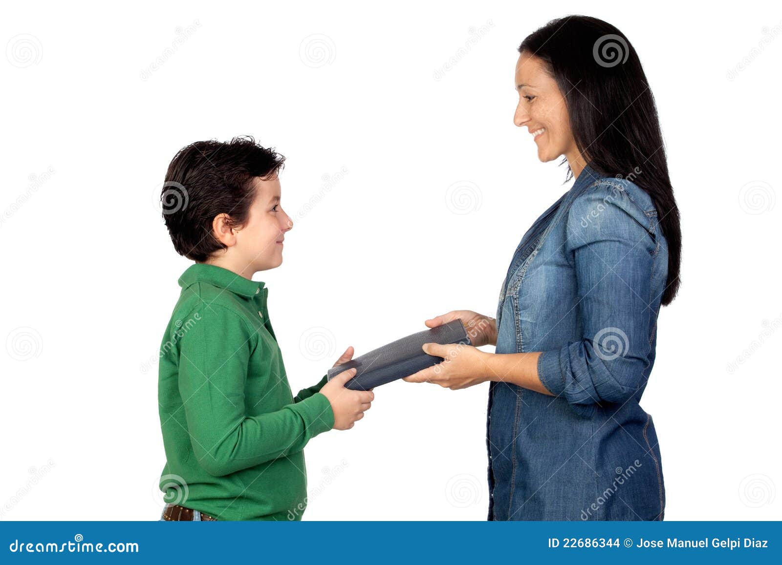 Mother Handing a Book To His Son Stock Photo - Image of attractive ...