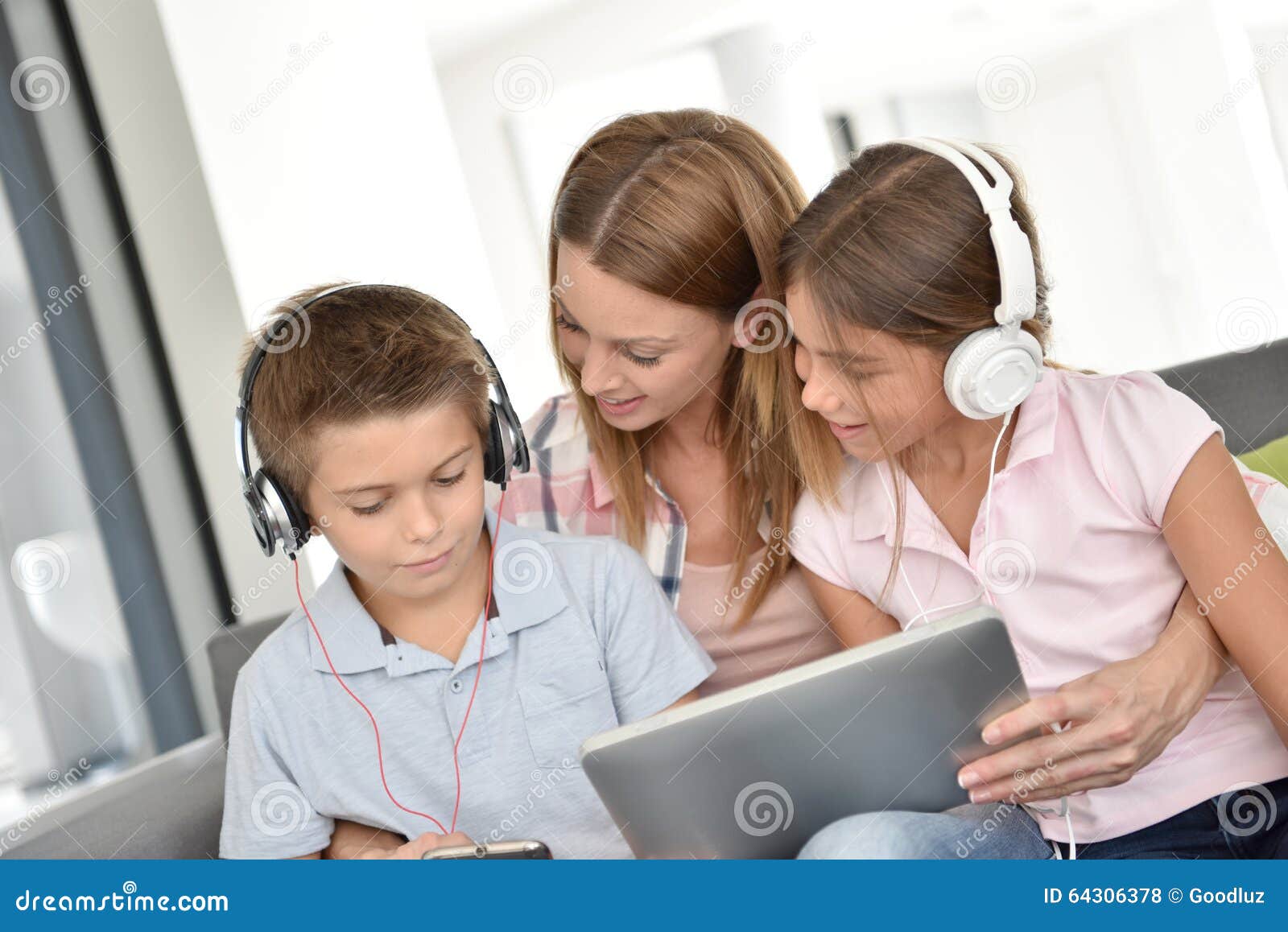 Mother and Happy Children Using Tablet at Home Stock Photo - Image of ...