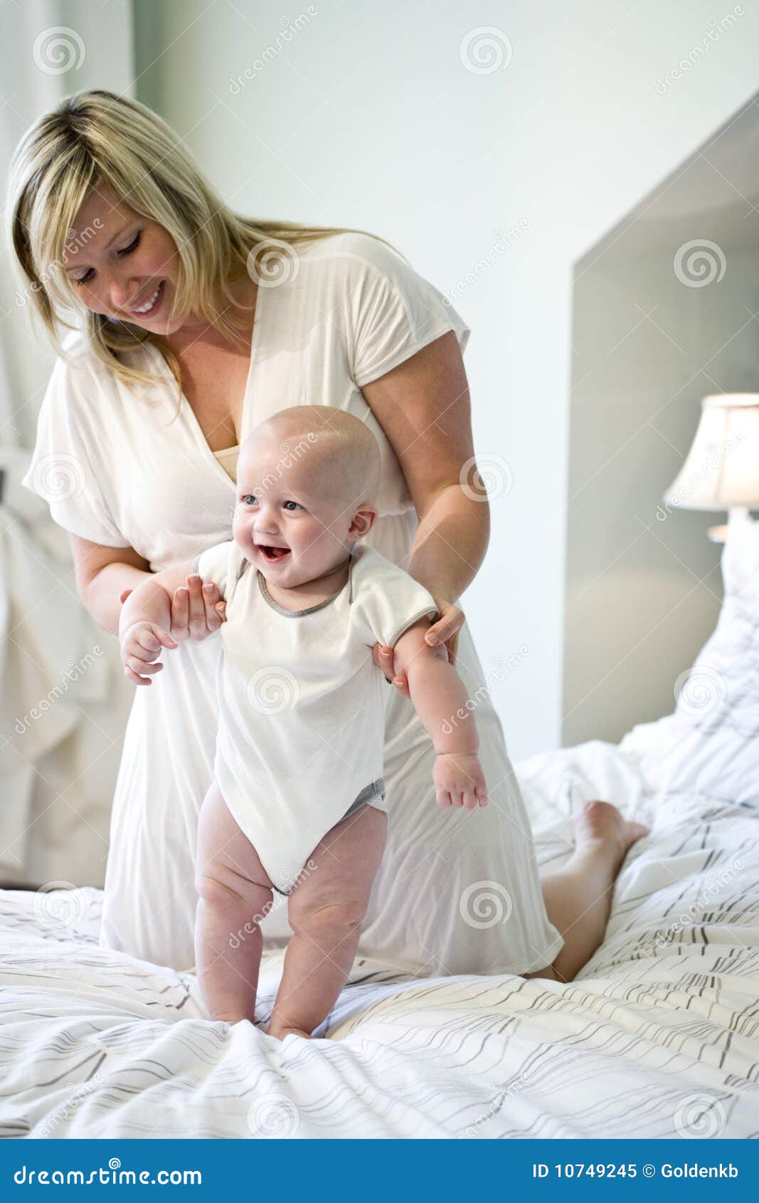 Mother Helping Baby Learn To Walk Stock Image - Image of caucasian ...