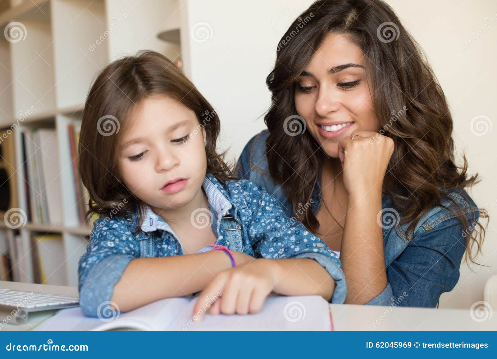 Mother Helping Child with Homework Stock Image - Image of people, child ...