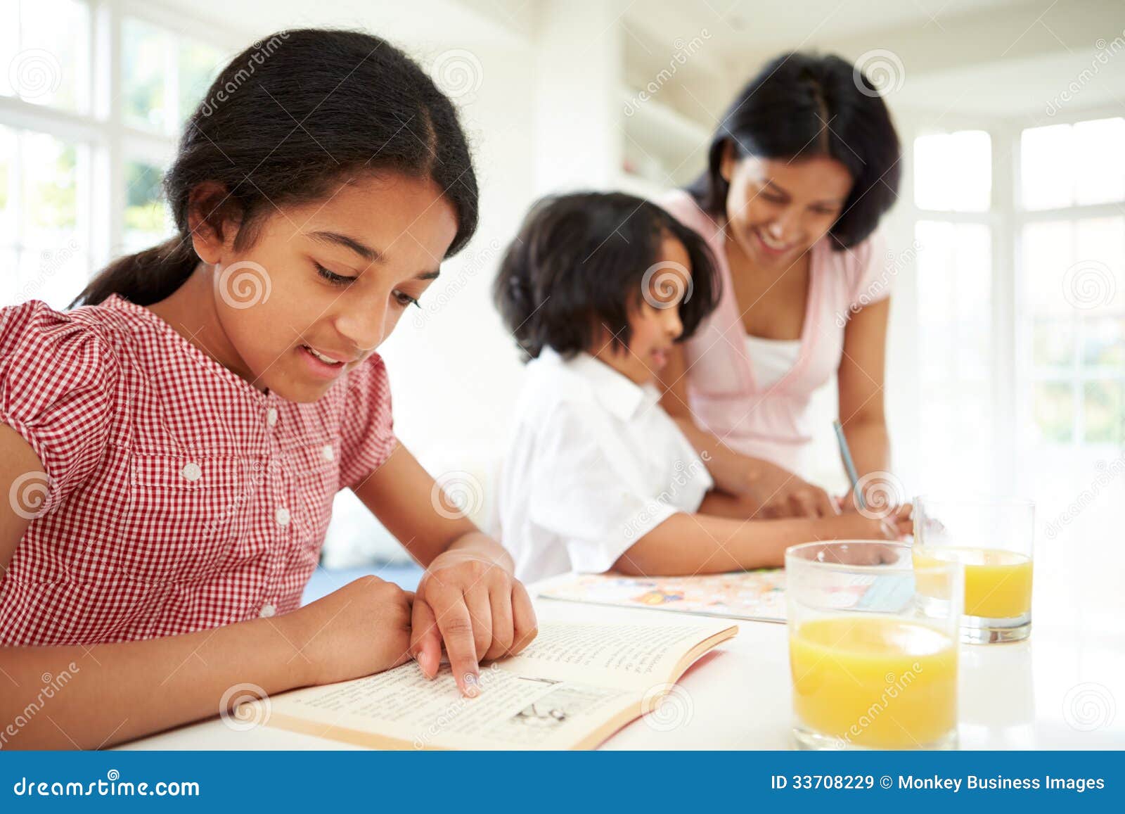 Mother Helping Children with Homework Stock Image - Image of child ...