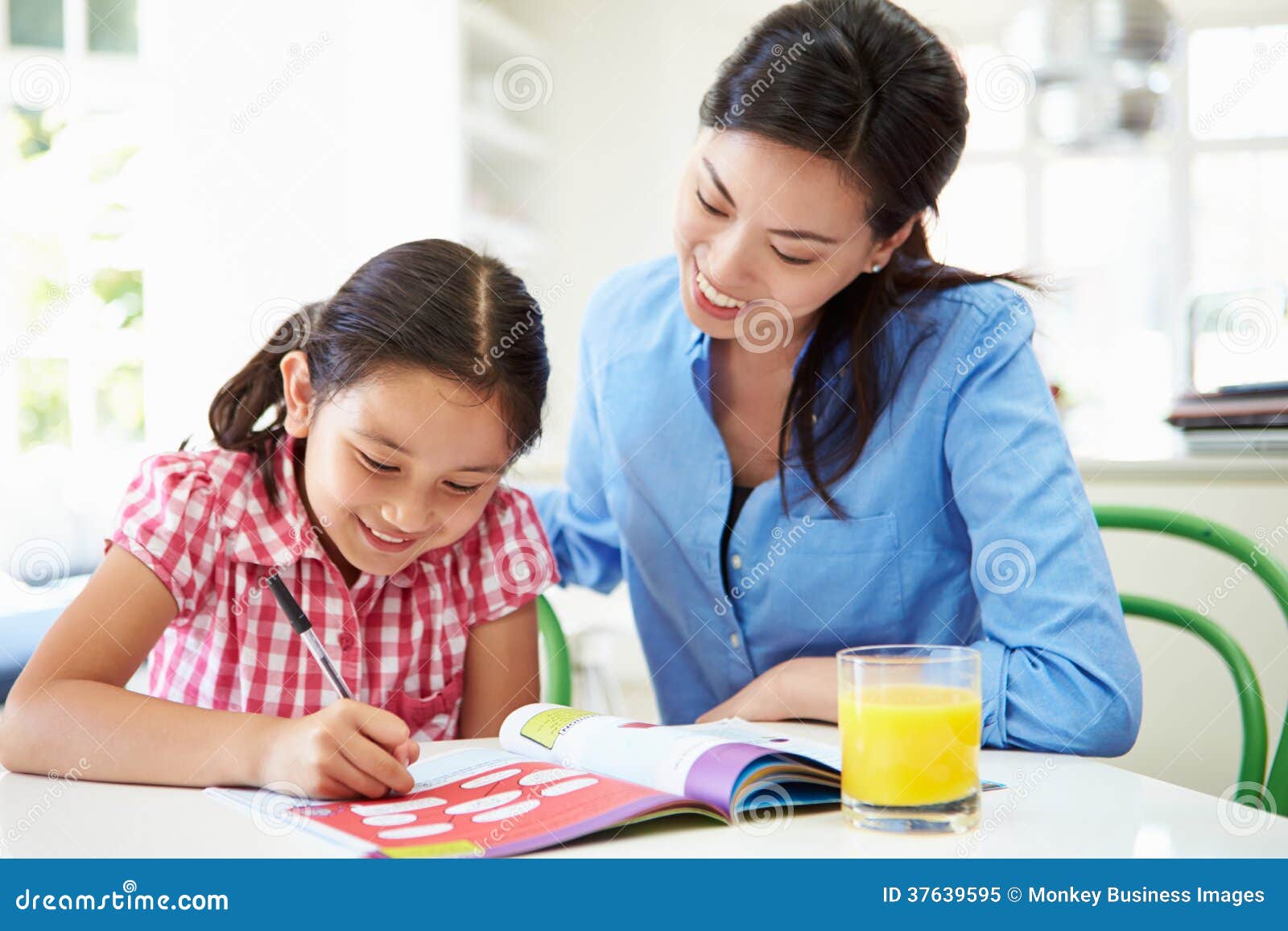 Mother Helping Daughter with Homework Stock Image - Image of mother ...