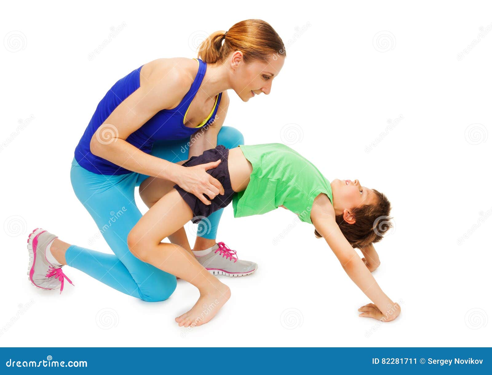 Mother Helping Her Kid Son Making a Crab Posture Stock Image - Image of ...