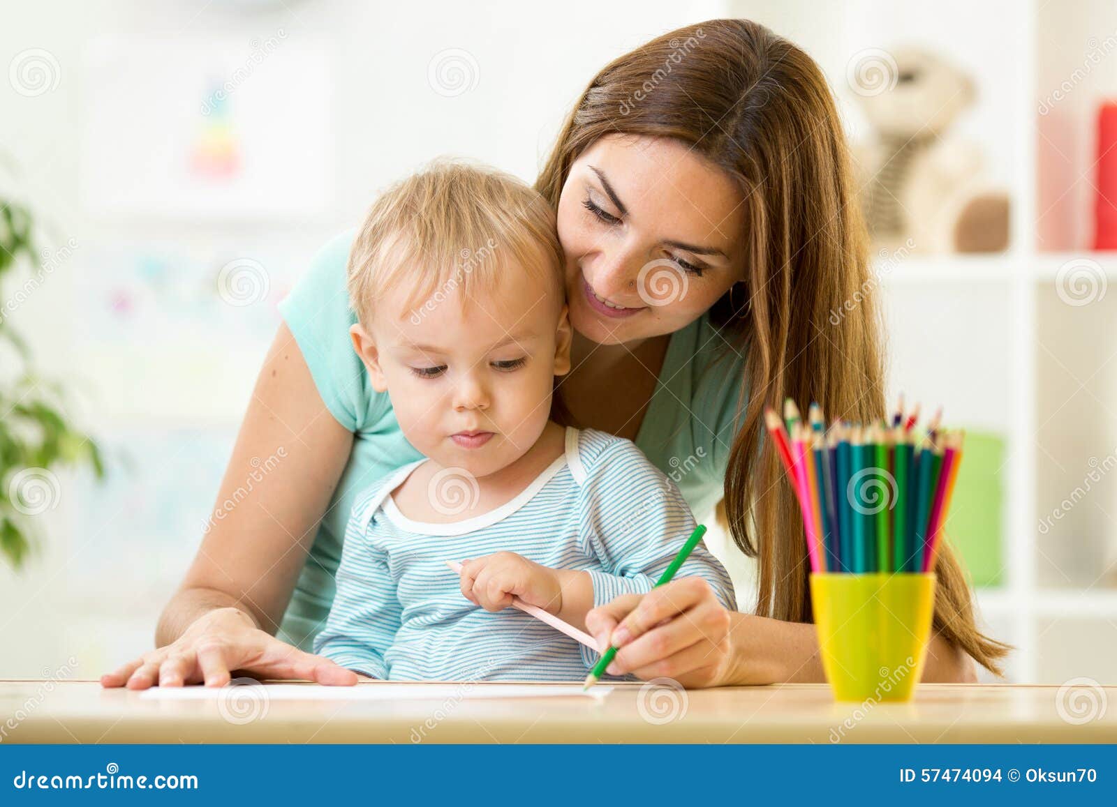 Mother Helping Her Kid To Make Drawings Stock Photo - Image of ...