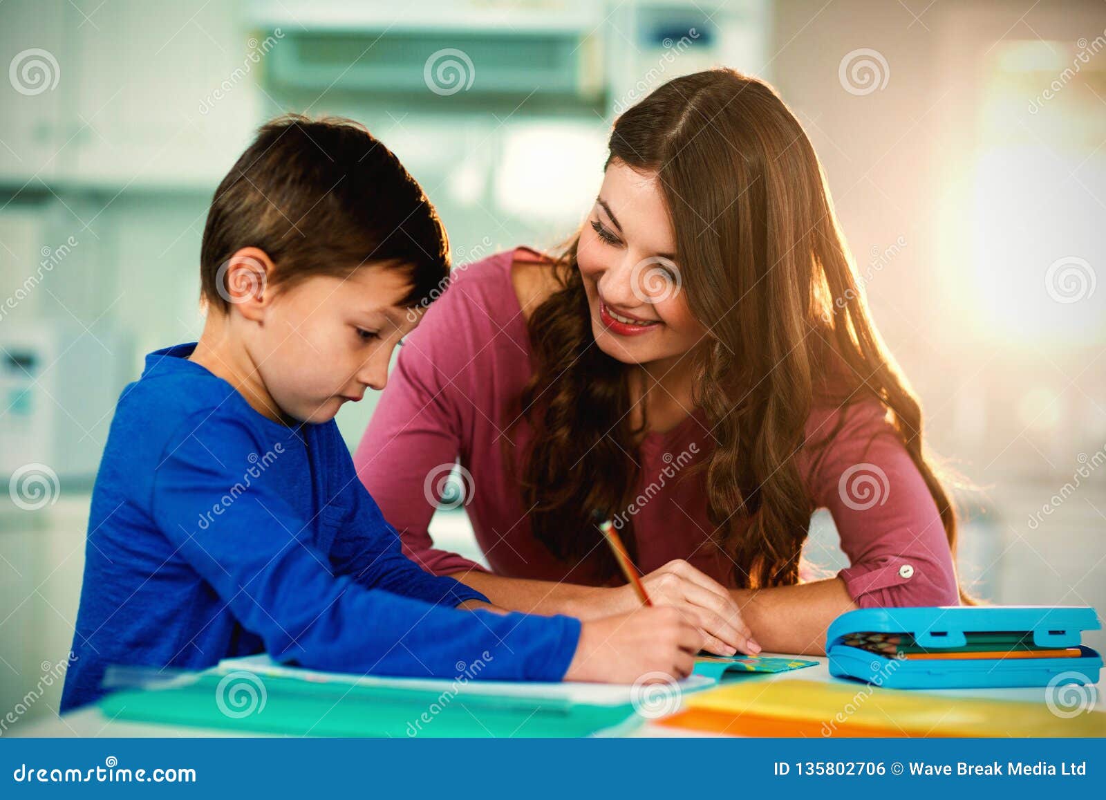 Mother Helping Her Son Doing Homework Stock Photo - Image of home ...