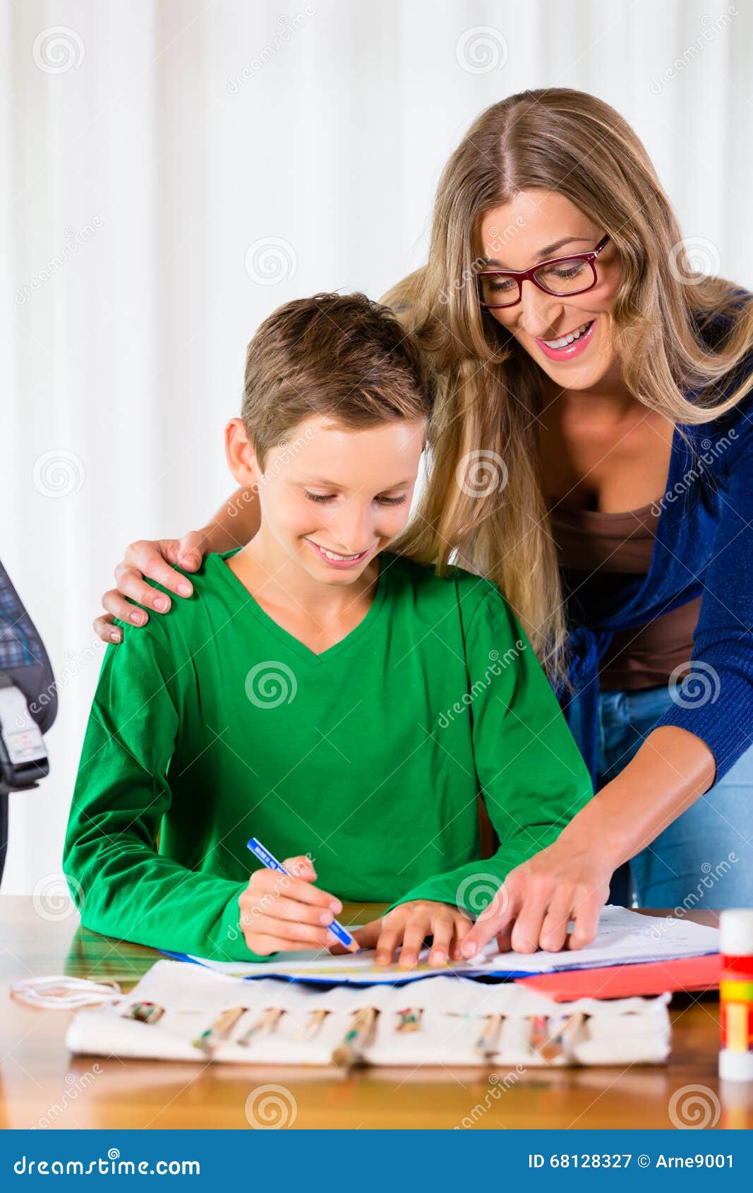 Mother Helping Son with Homework Assignment Stock Image - Image of ...