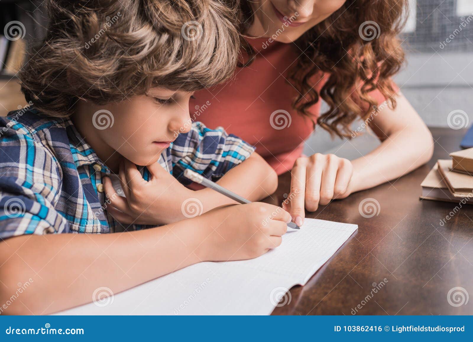 Mother Helping Son with Homework Stock Photo - Image of educational ...