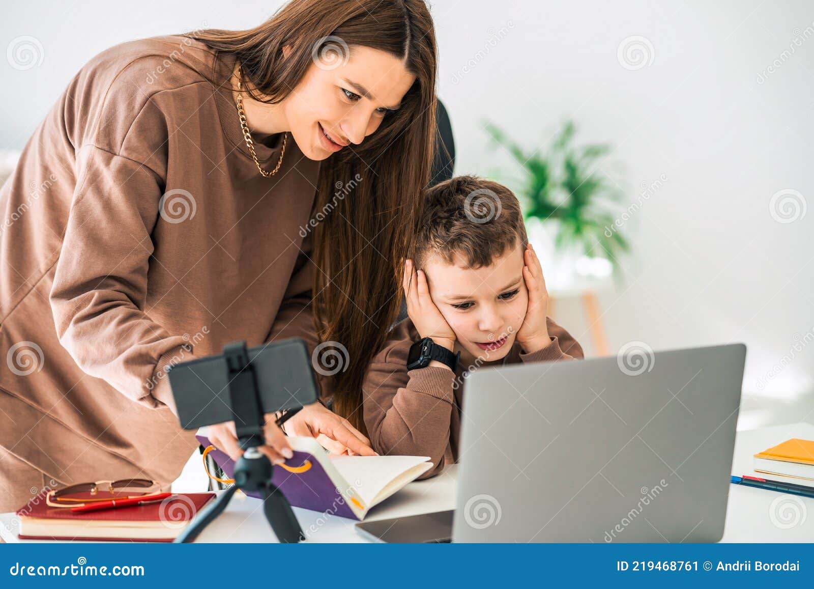 Mother Helps Her Son with Online Distance Education. Stock Image ... Mother Helps Her Son with Online Distance Education. Stock Image ...