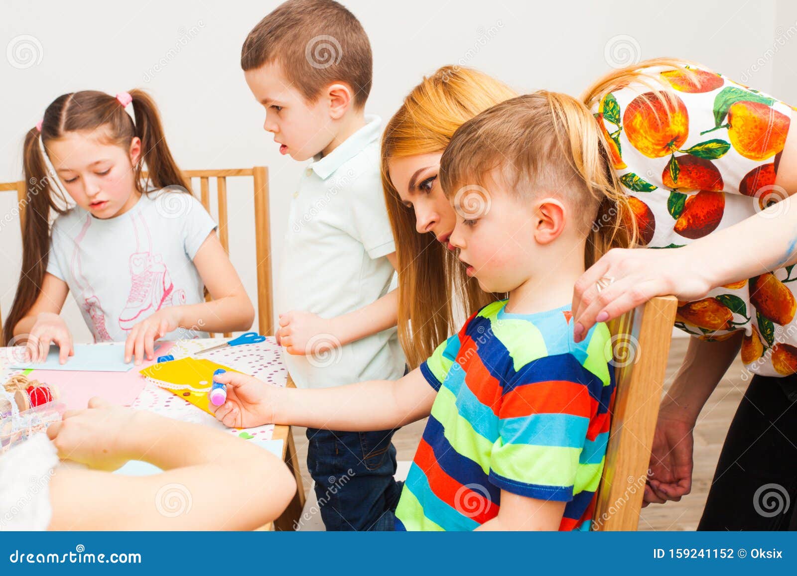 Mother Helps His Son To Make Postcard Stock Photo - Image of childhood ... Mother Helps His Son To Make Postcard Stock Photo - Image of childhood ...