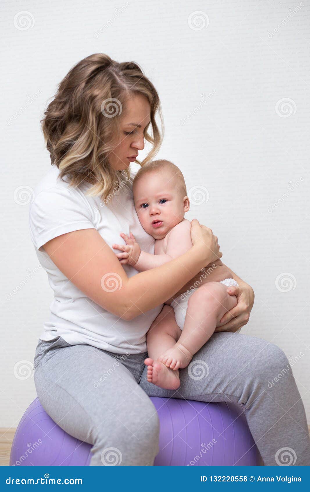 Mother and Her Baby Doing Exercises on a Ball Stock Photo - Image of ...