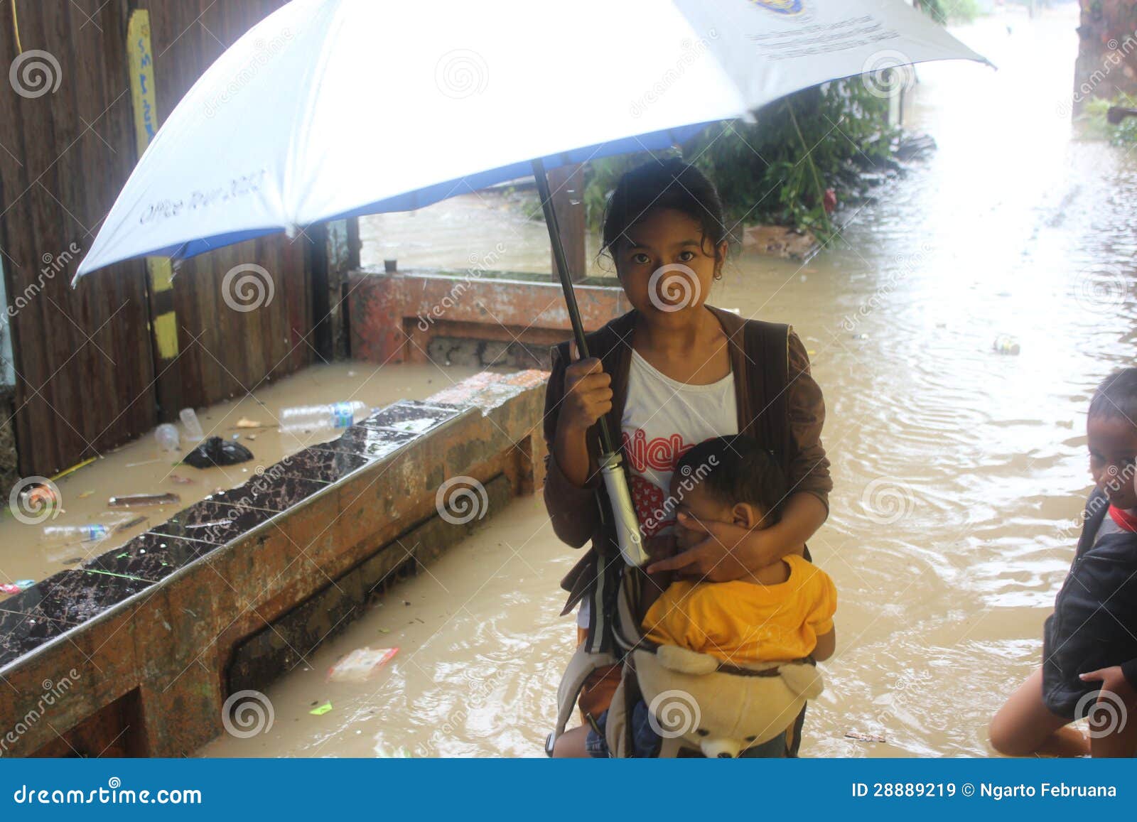Mother and Her Baby in the Flood Editorial Stock Image - Image of river ...