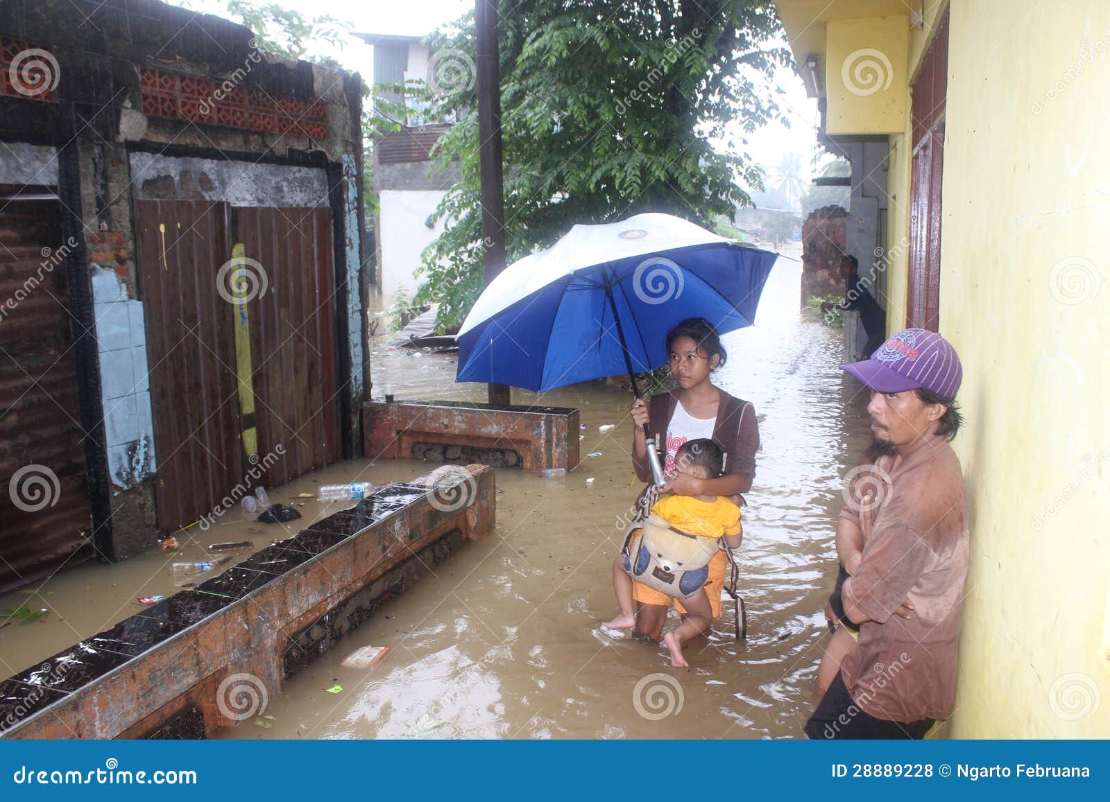 Mother and Her Baby in the Flood Editorial Stock Photo - Image of ...