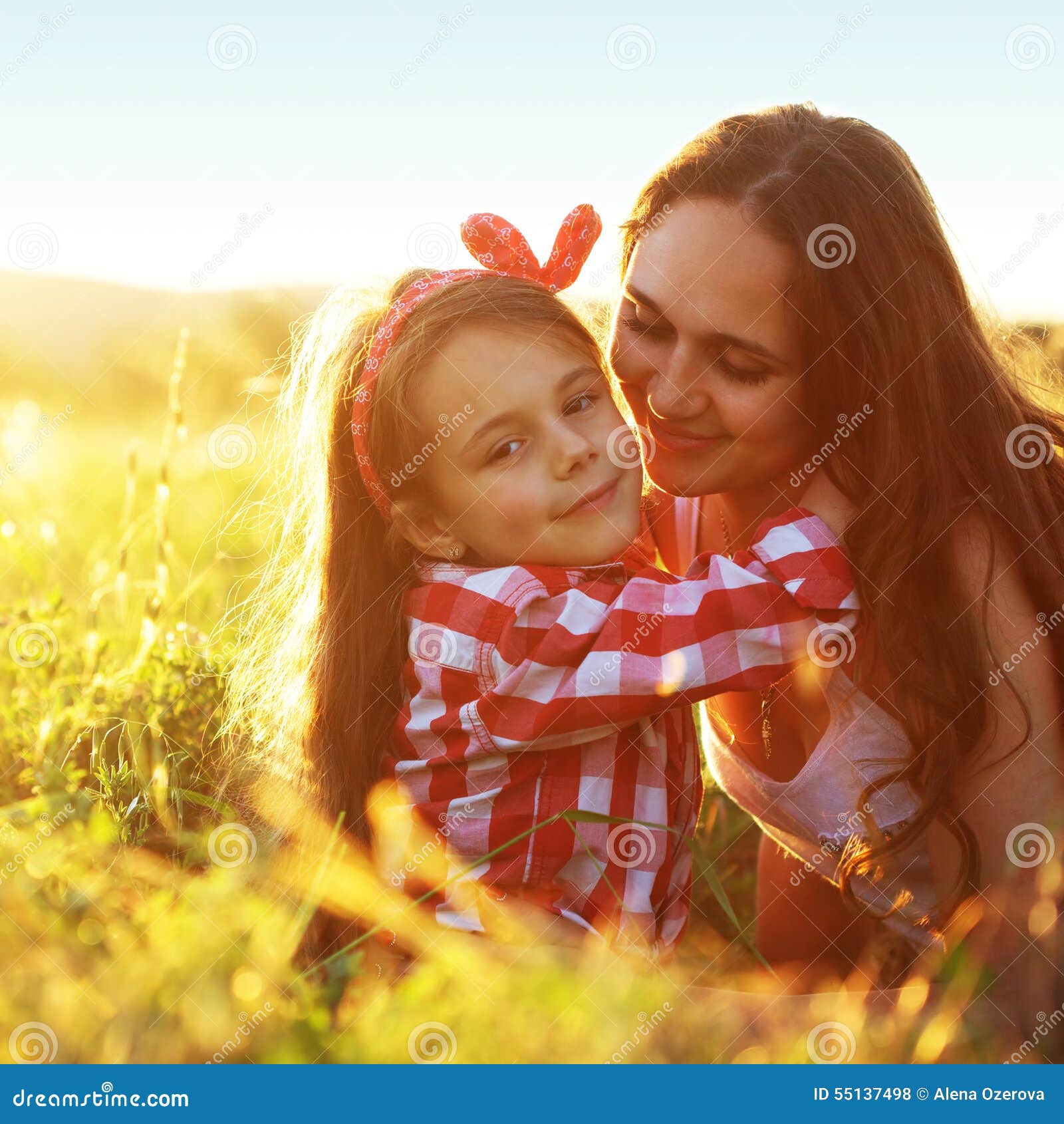 Mother with Her Child in Spring Field Stock Photo - Image of child ...