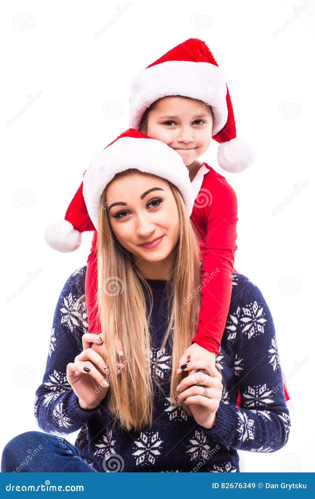 Mother With Her Daughter In Christmas Hat Stock Image Image Of